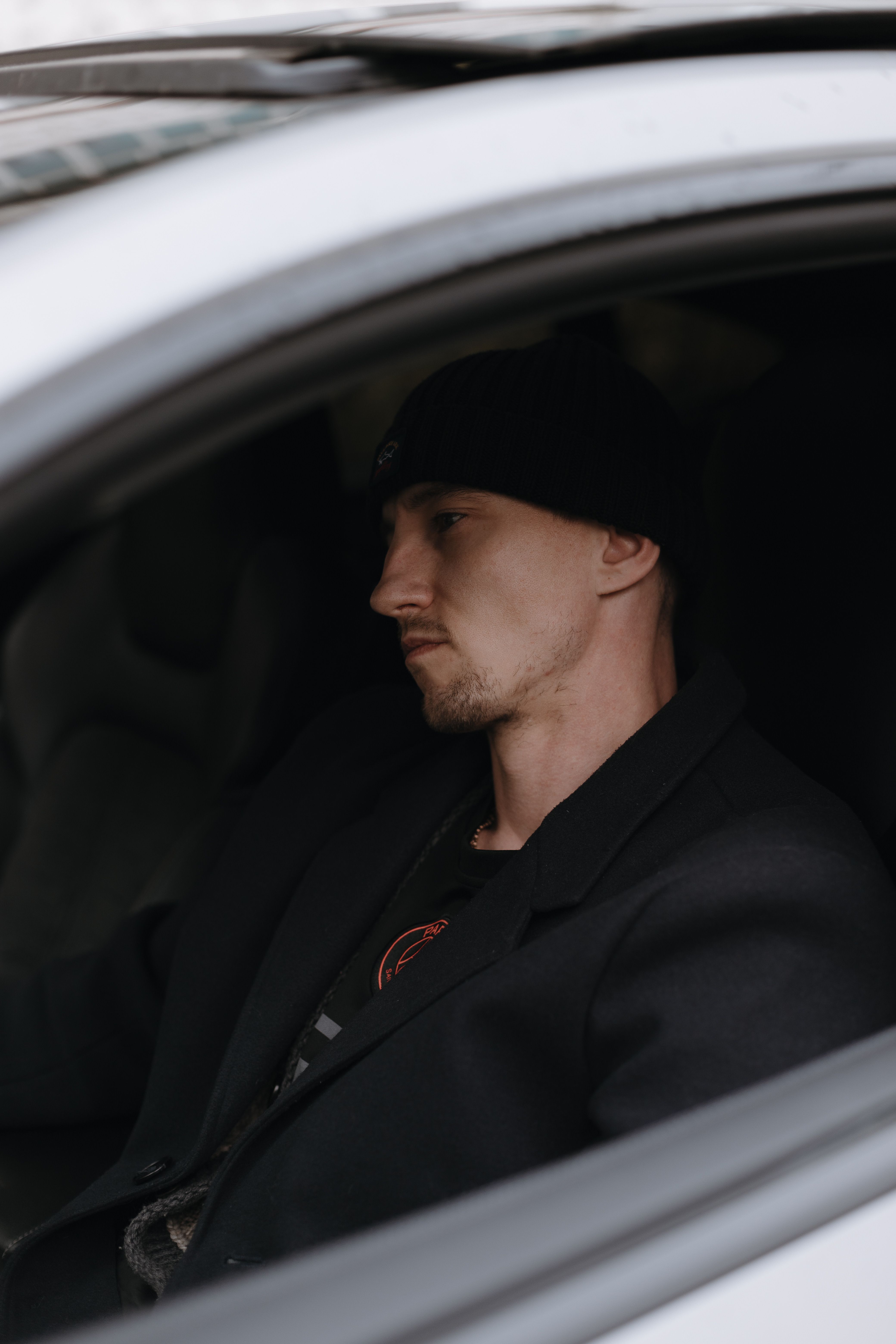 Portrait of a Man in Car Wearing Black Hat · Free Stock Photo