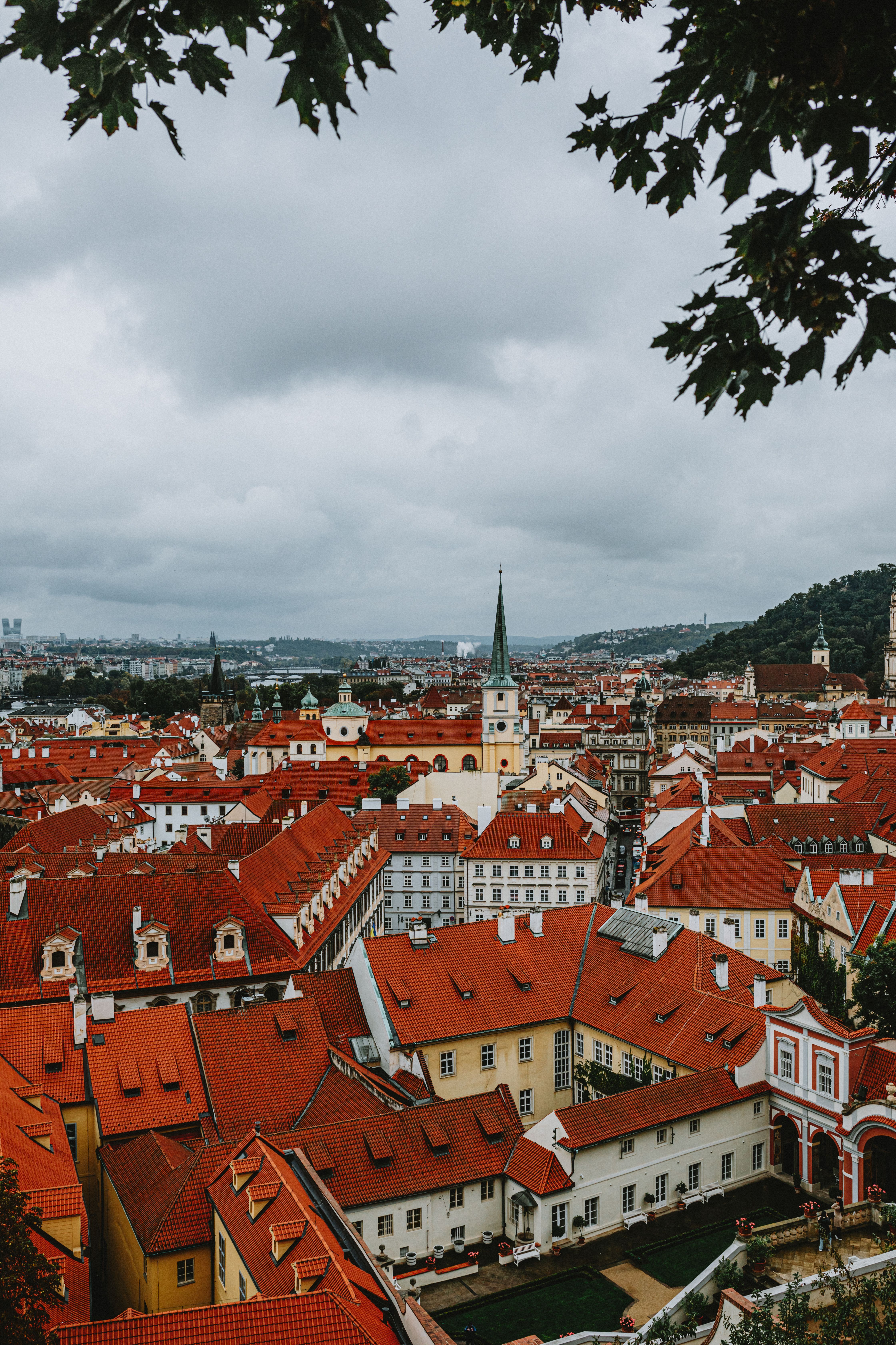 Aerial View of Prague's Historic Red Rooftops · Free Stock Photo