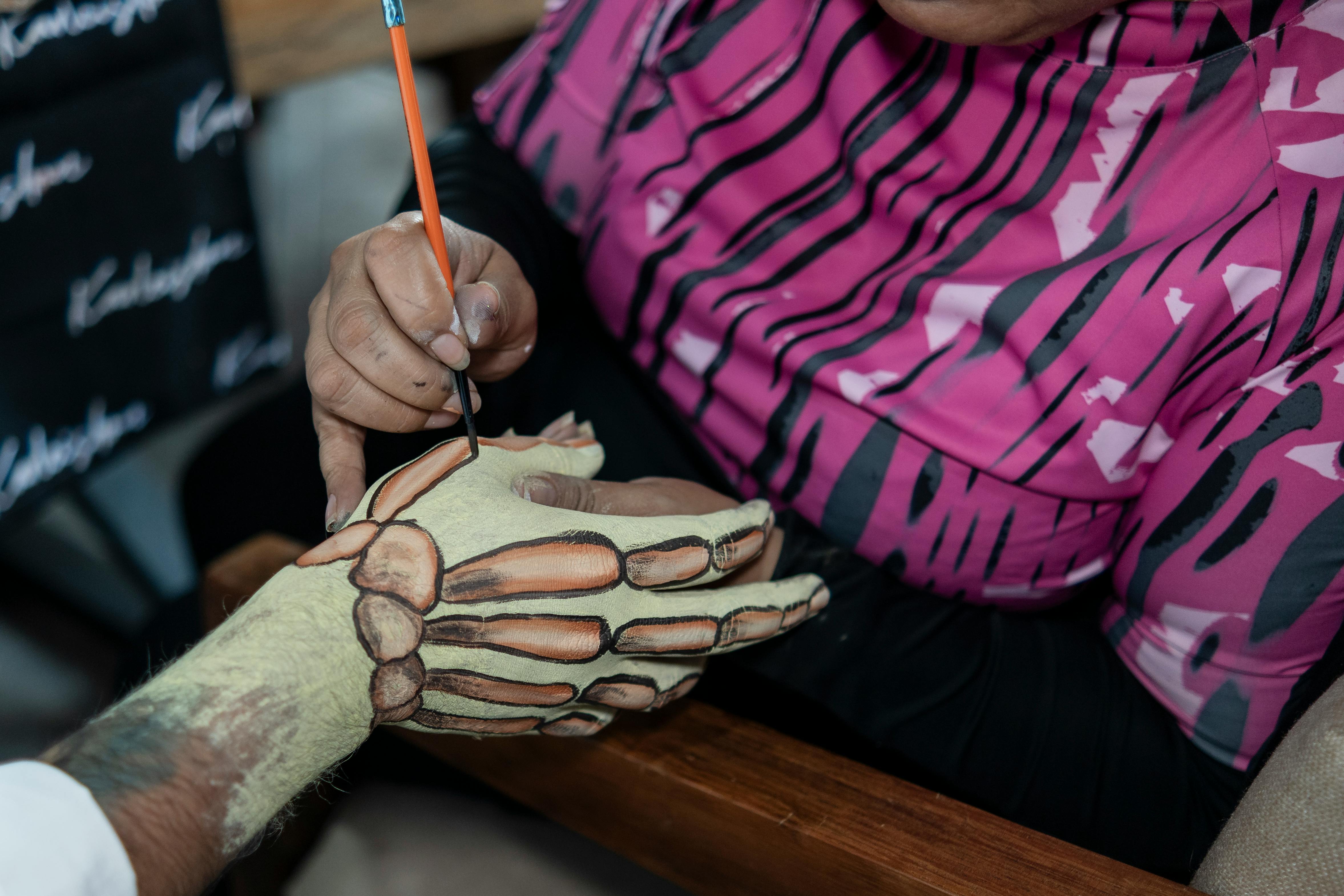 Creative Skeleton Hand Painting Close-Up · Free Stock Photo