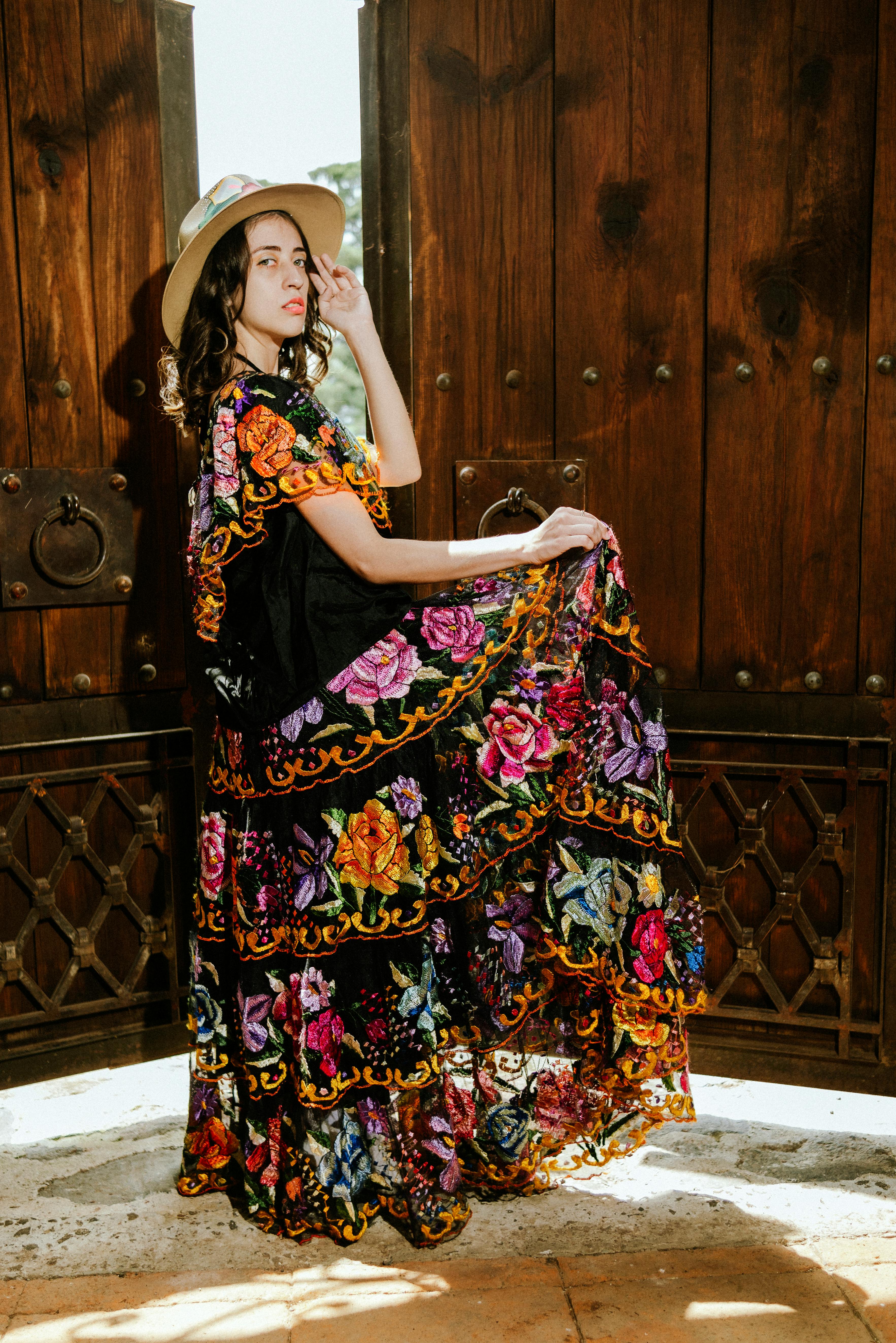 Colorful Traditional Dress in Sunlit Setting · Free Stock Photo