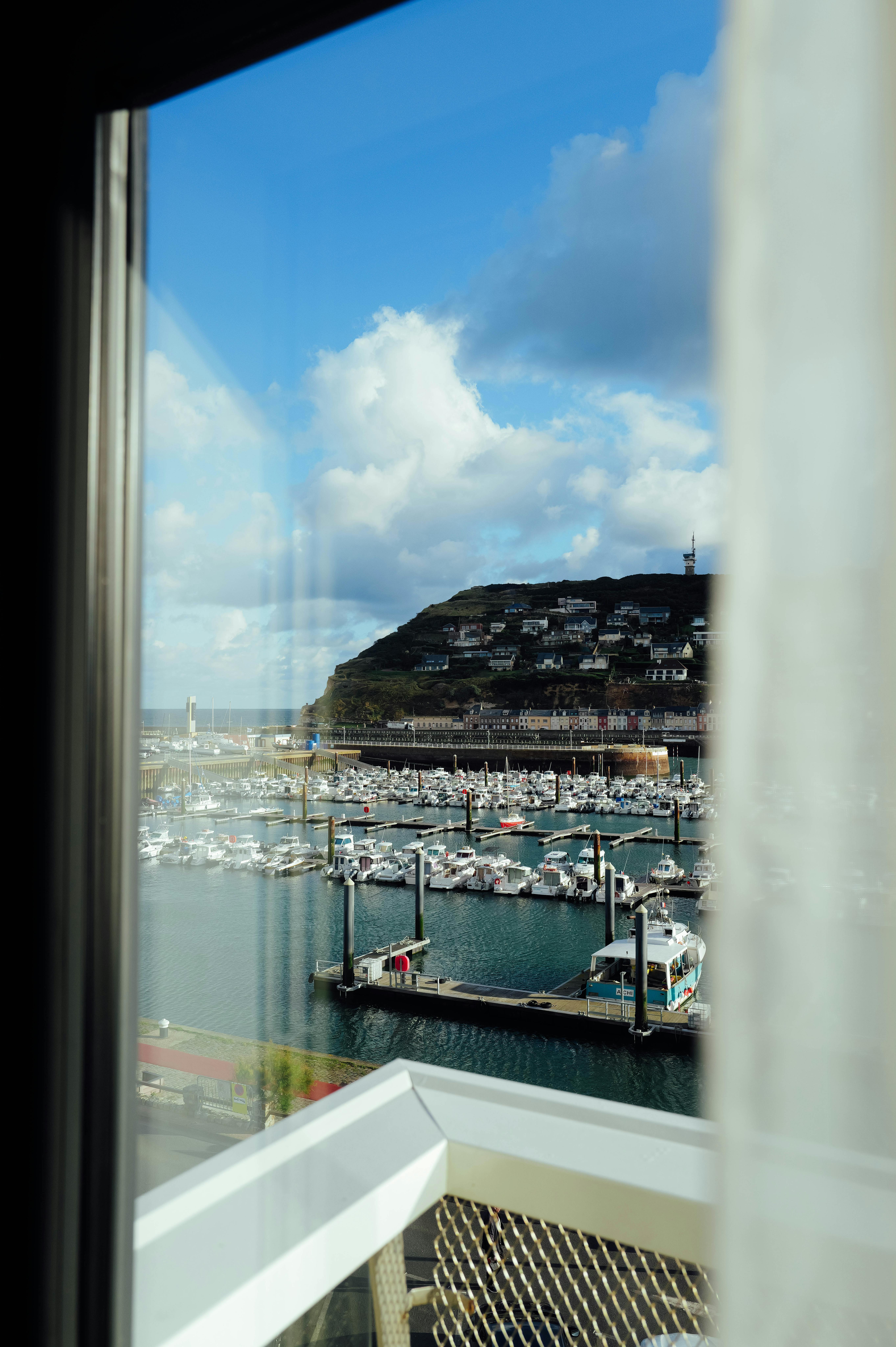 Scenic Marina View through a Window · Free Stock Photo