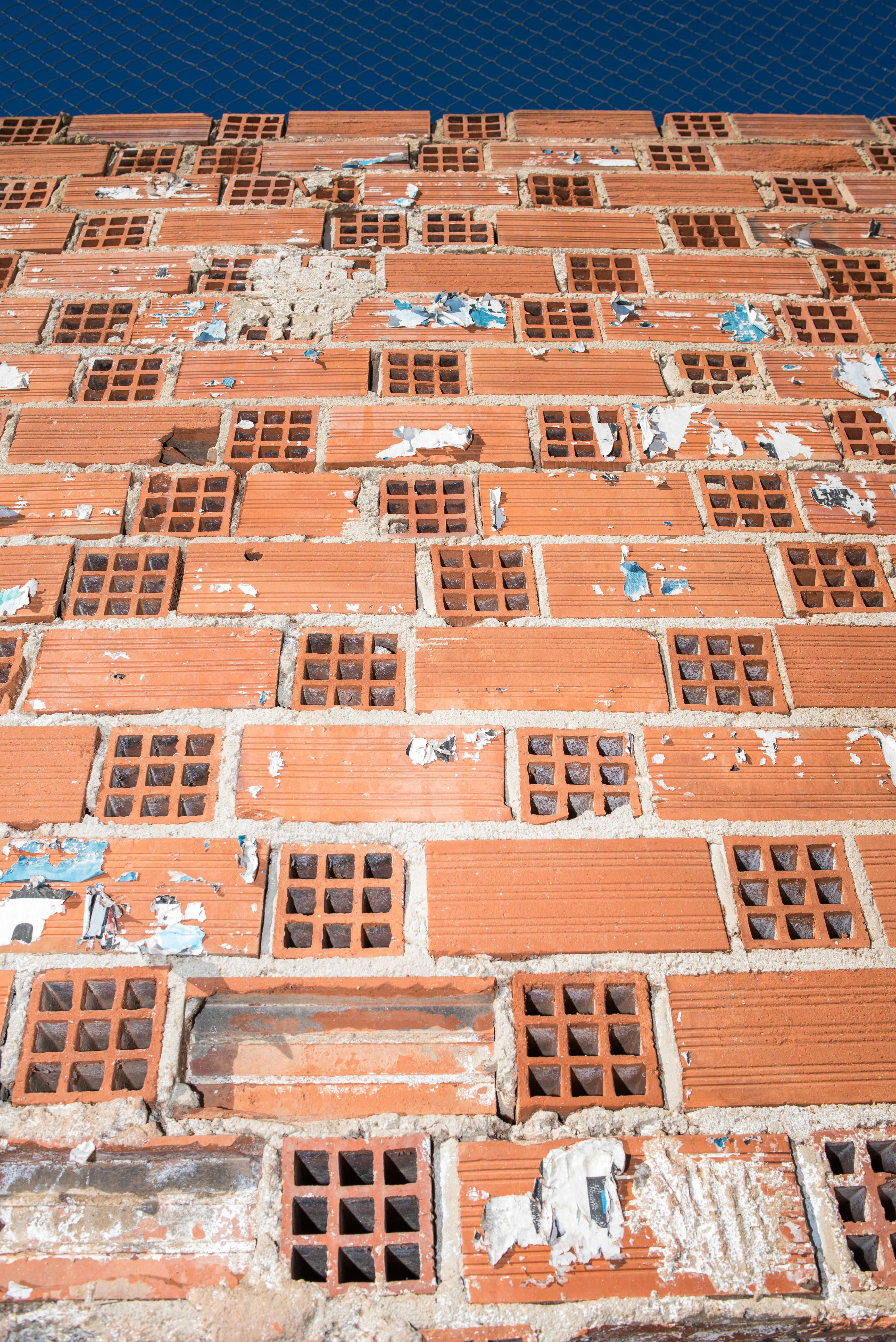 Weathered Brick Wall Texture with Grid Patterns · Free Stock Photo
