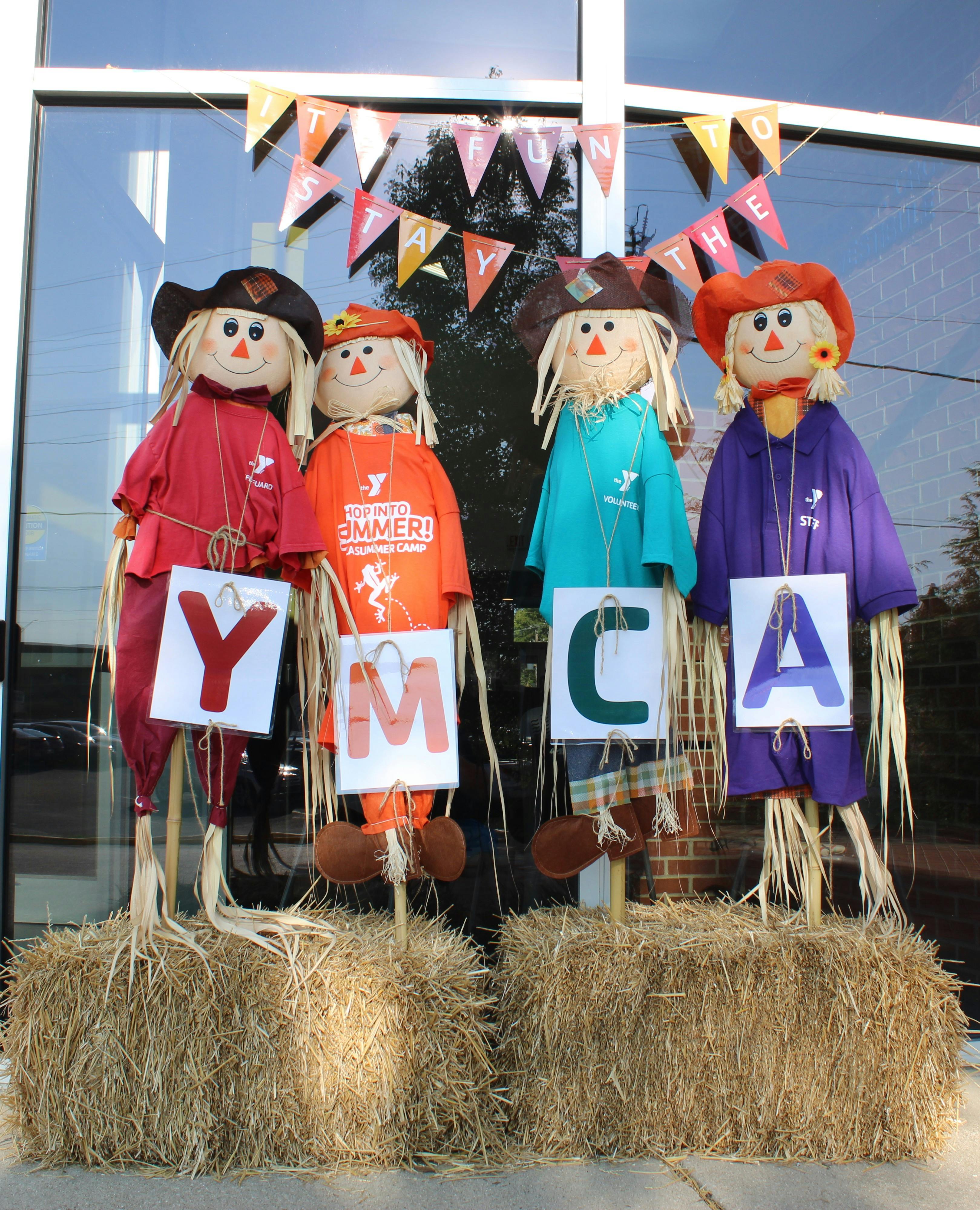 Colorful Scarecrow Display Celebrating YMCA · Free Stock Photo