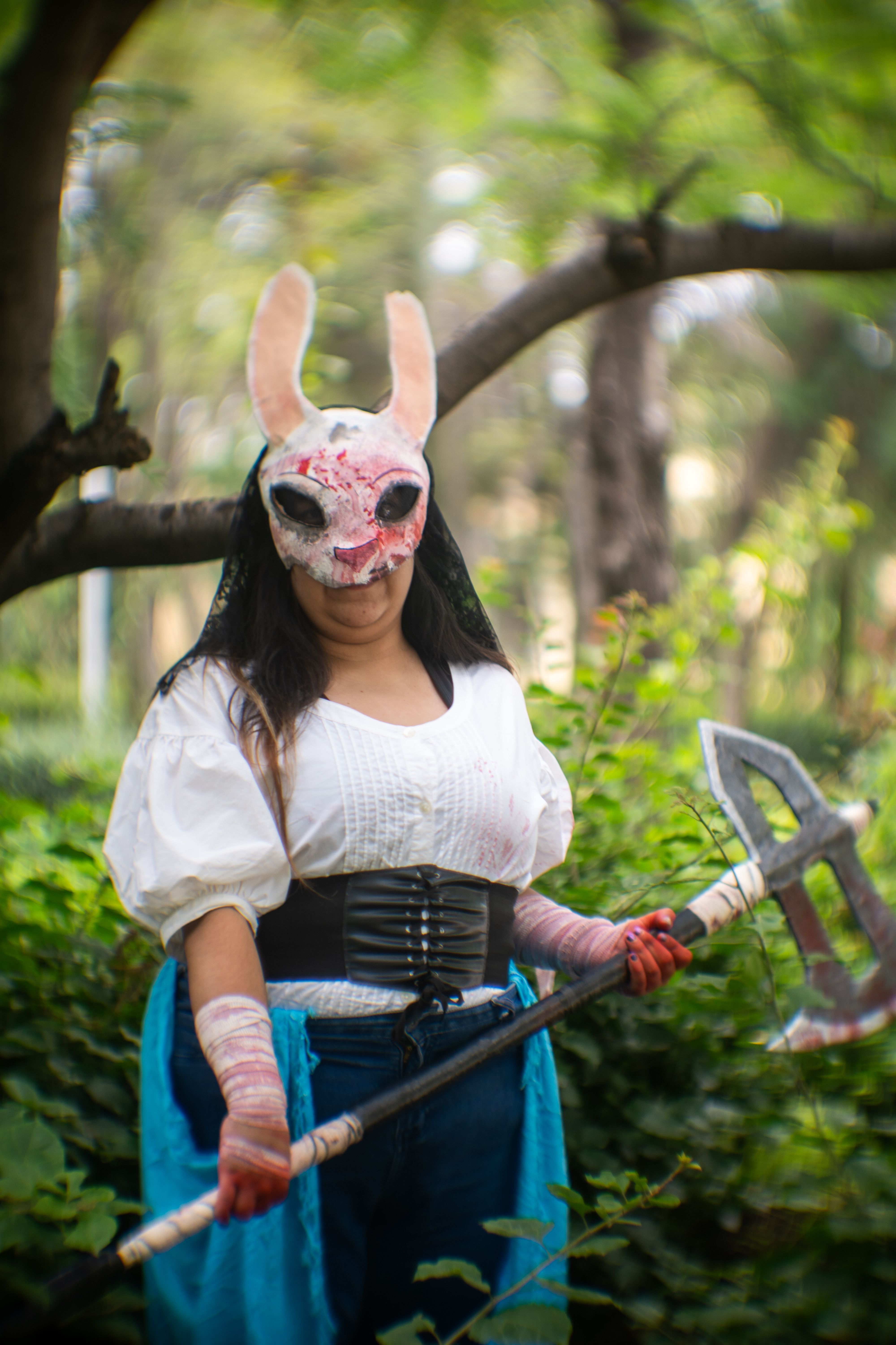 Cosplayer in Dark Fantasy Costume with Mask · Free Stock Photo