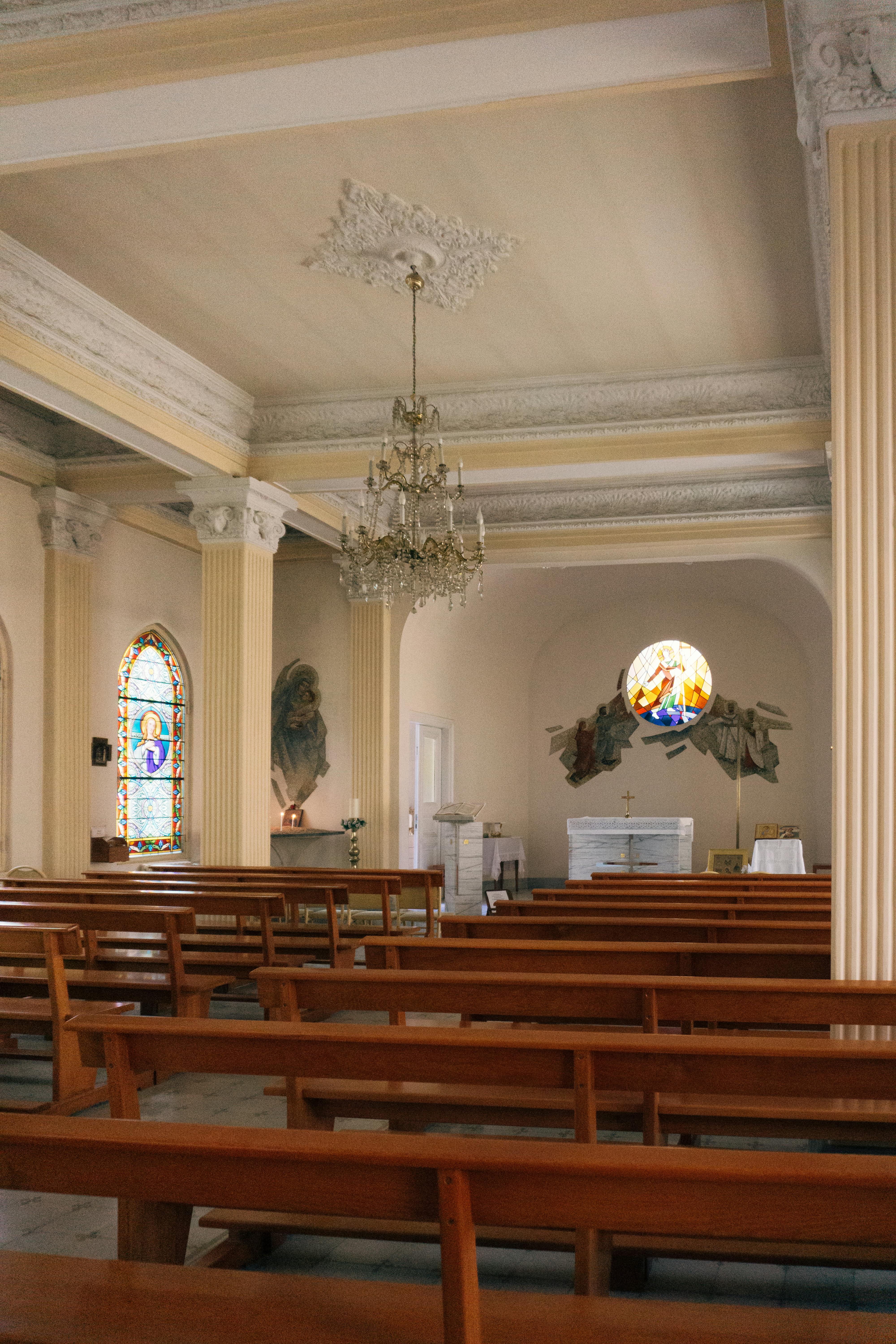 Empty Church Interior with Stained Glass Windows · Free Stock Photo