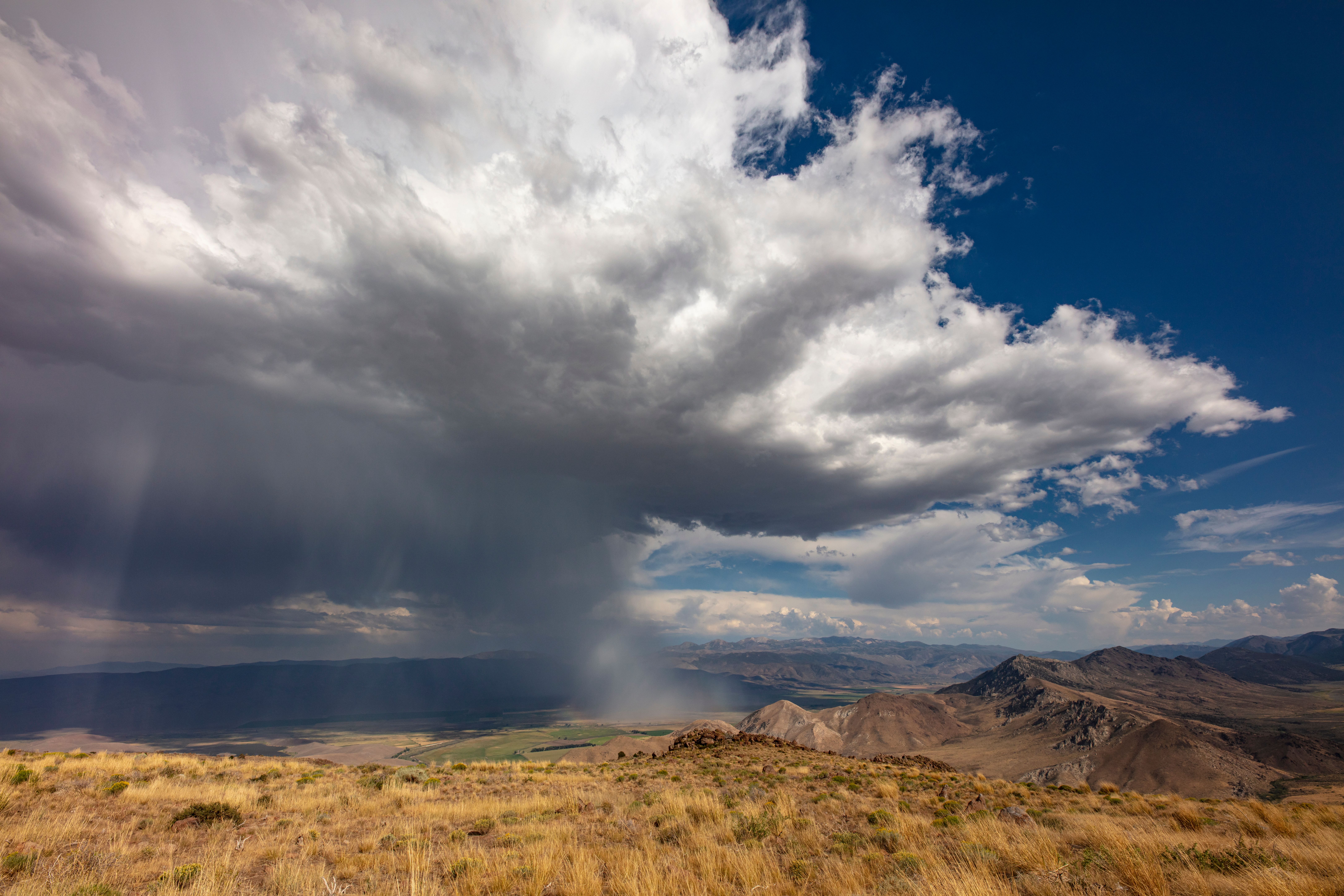 Dramatic Storm Cloud Over Mountain Landscape · Free Stock Photo