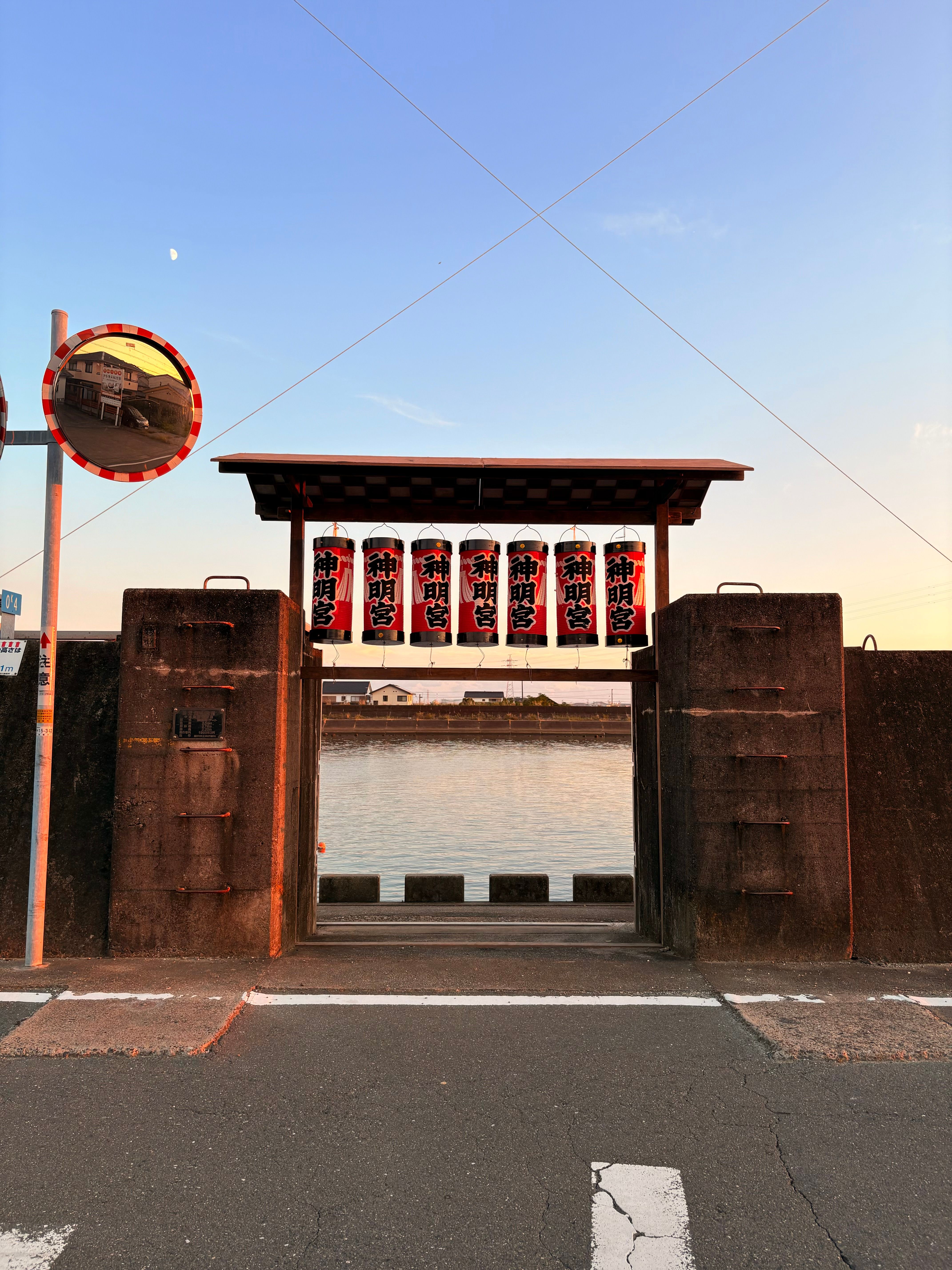 Traditional Japanese Gate Overlooking Waterfront · Free Stock Photo