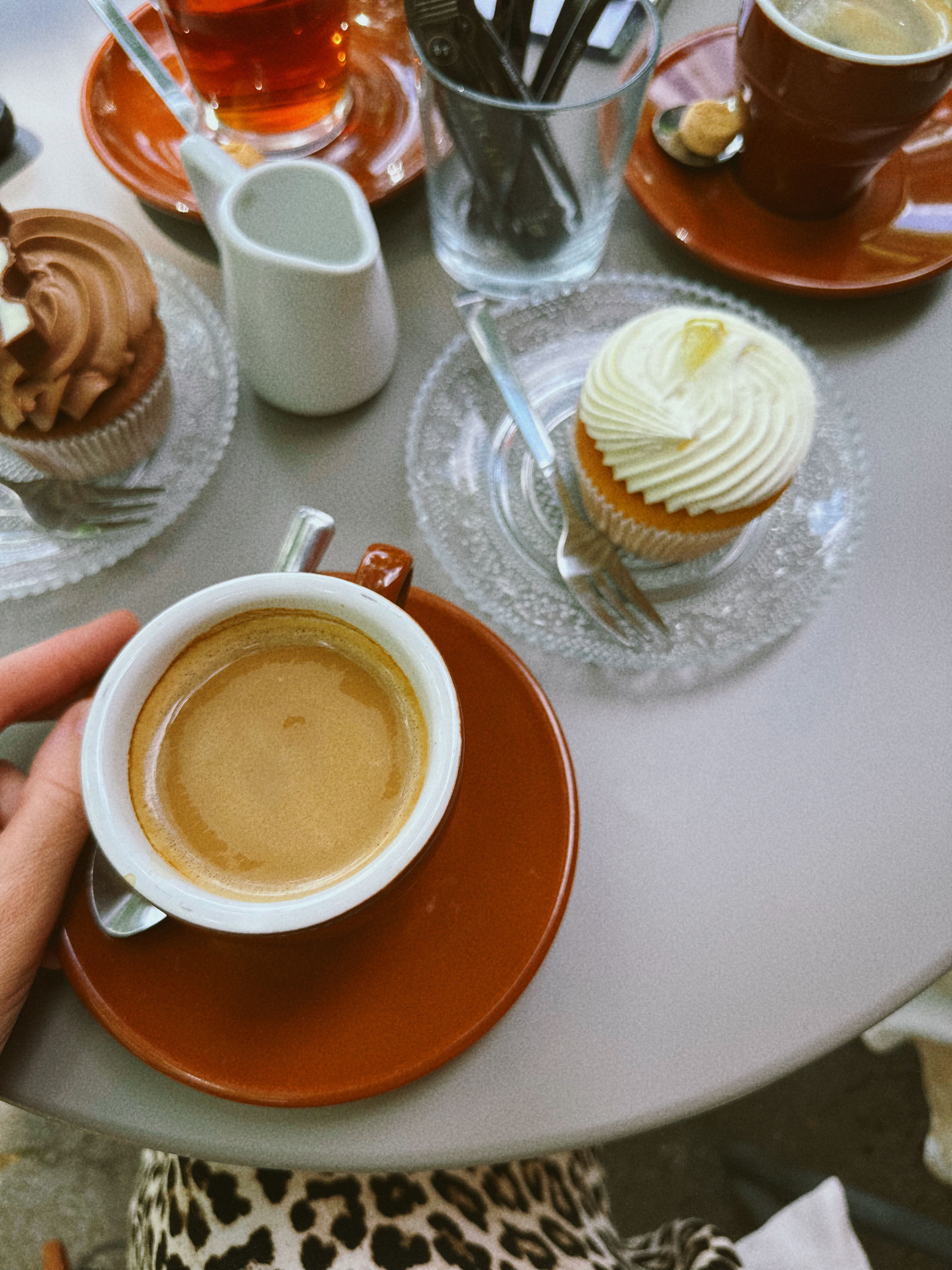 Cozy Coffee Break with Cupcakes and Espresso · Free Stock Photo
