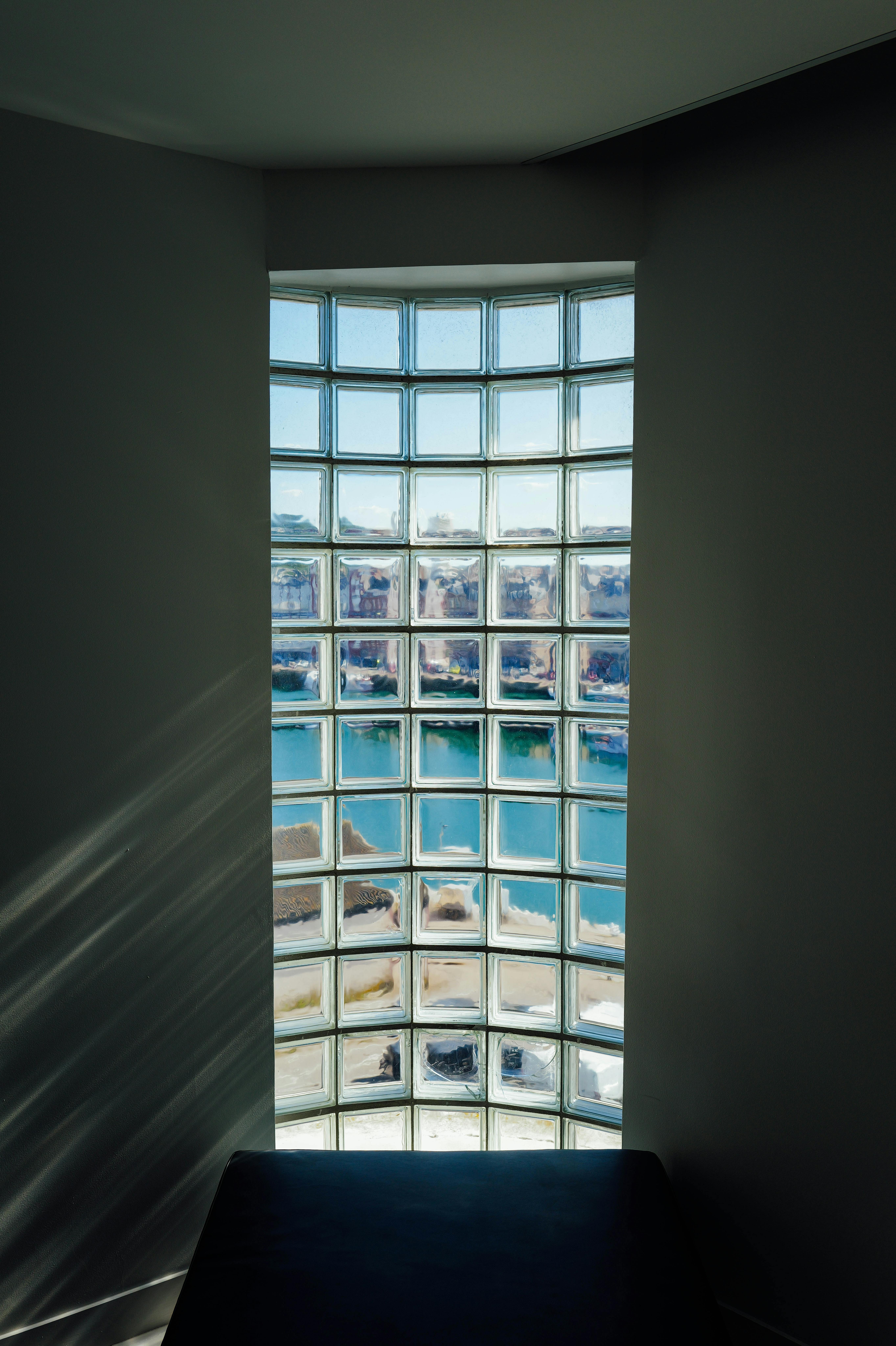 Scenic View Through Glass Blocks at Seaside · Free Stock Photo