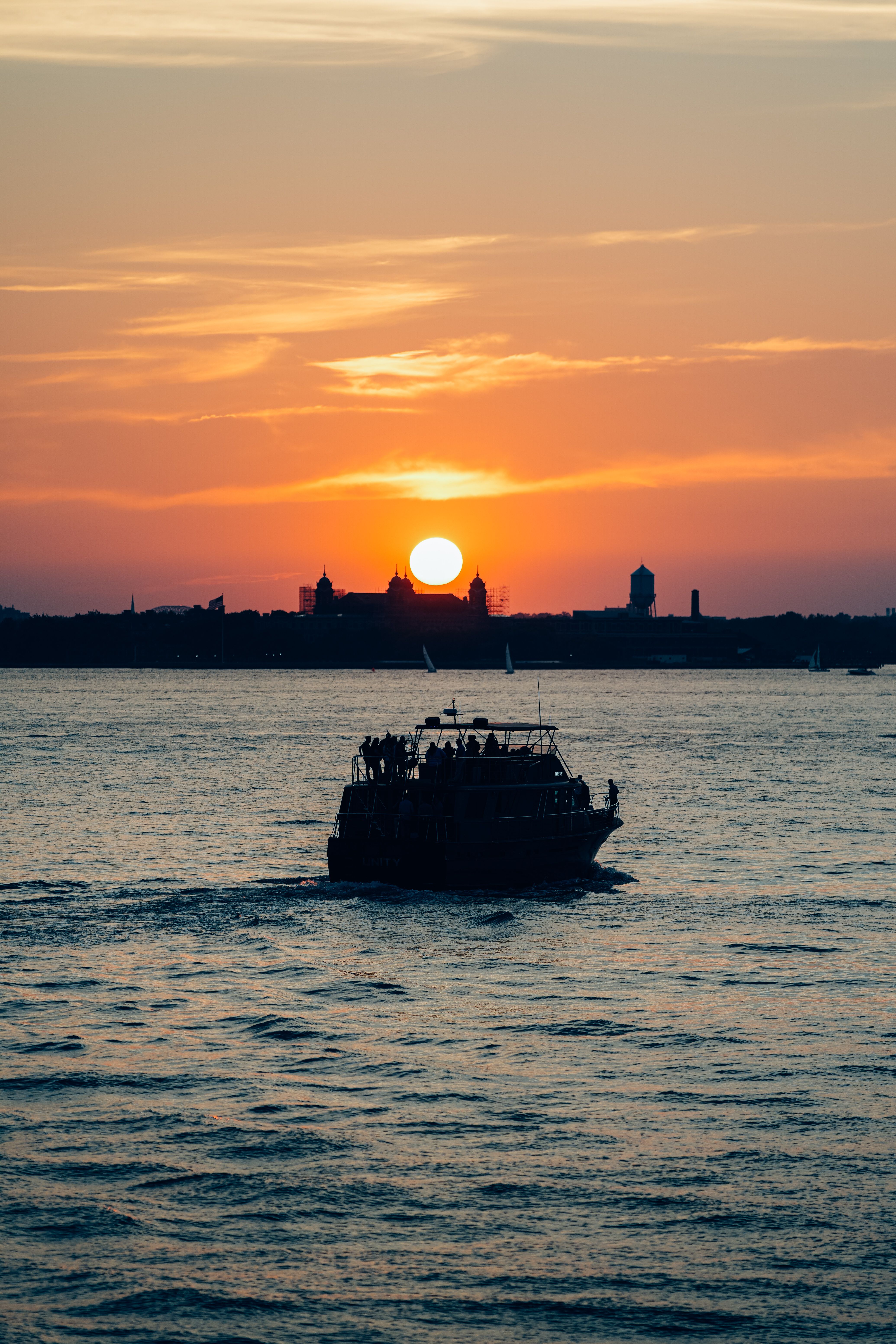 Staten Island Ferry at Sunset in New York Harbor · Free Stock Photo