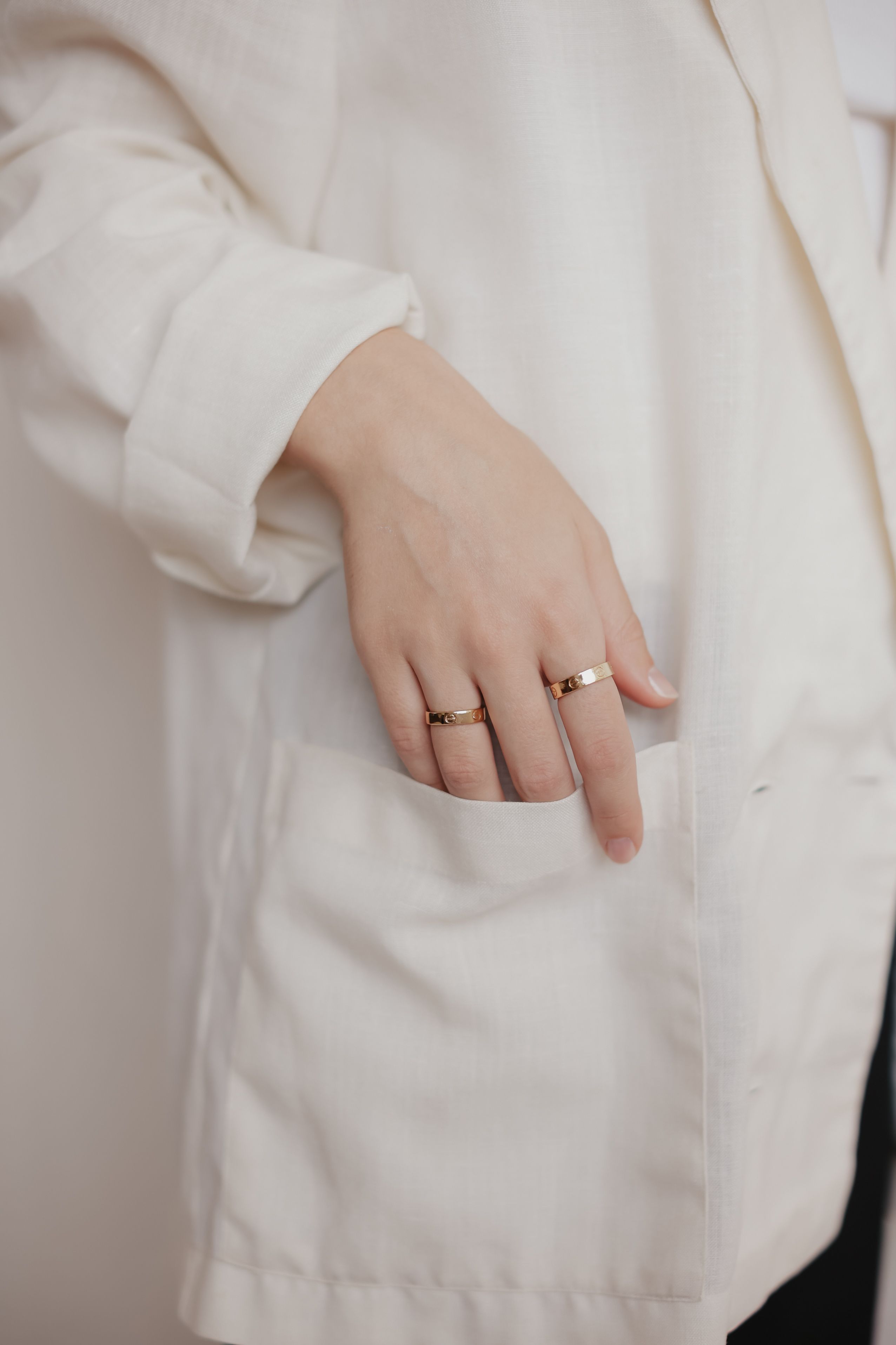 Elegant Hand with Rings in White Pocket · Free Stock Photo