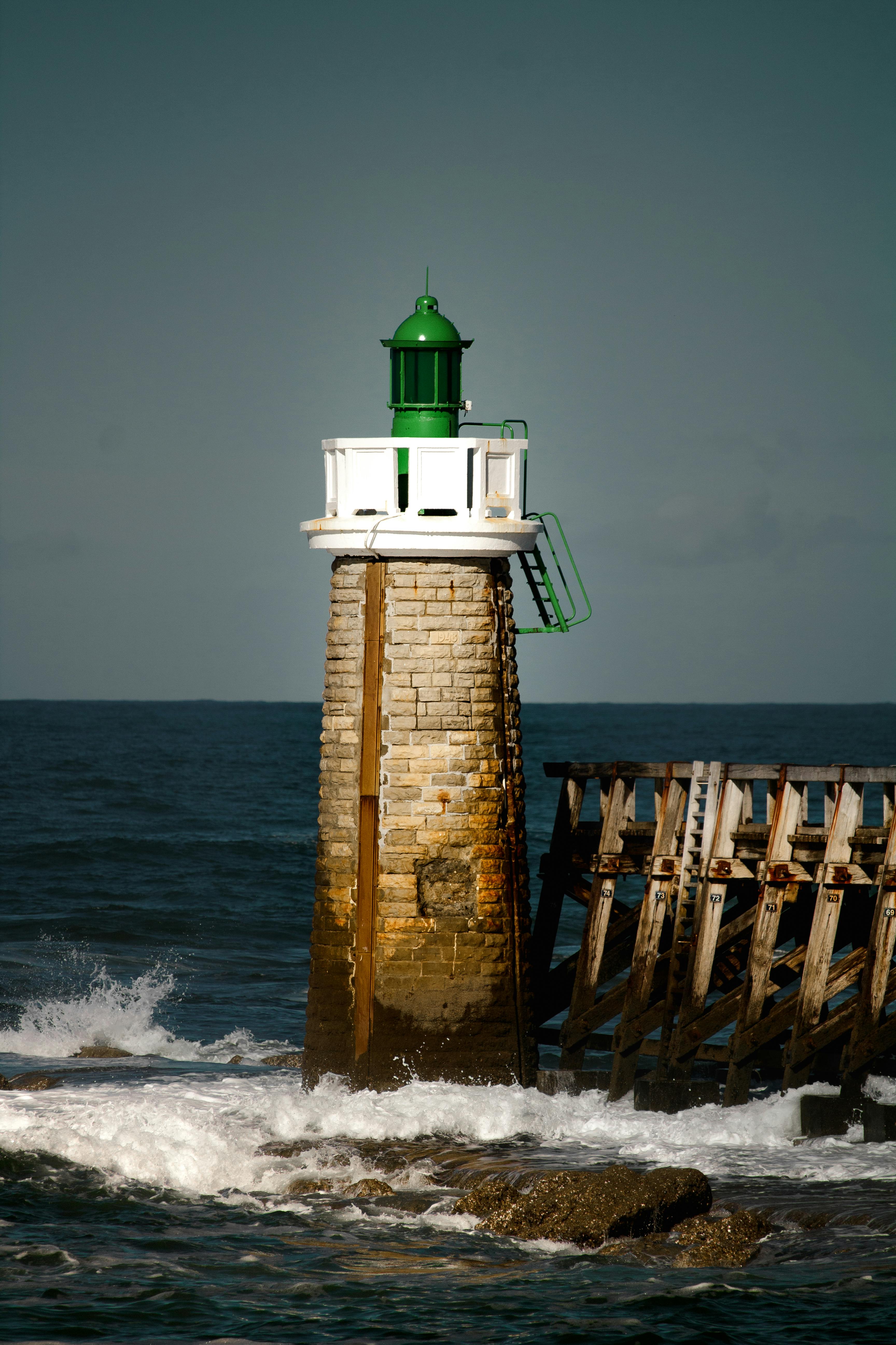 Scenic French Lighthouse by the Seaside · Free Stock Photo