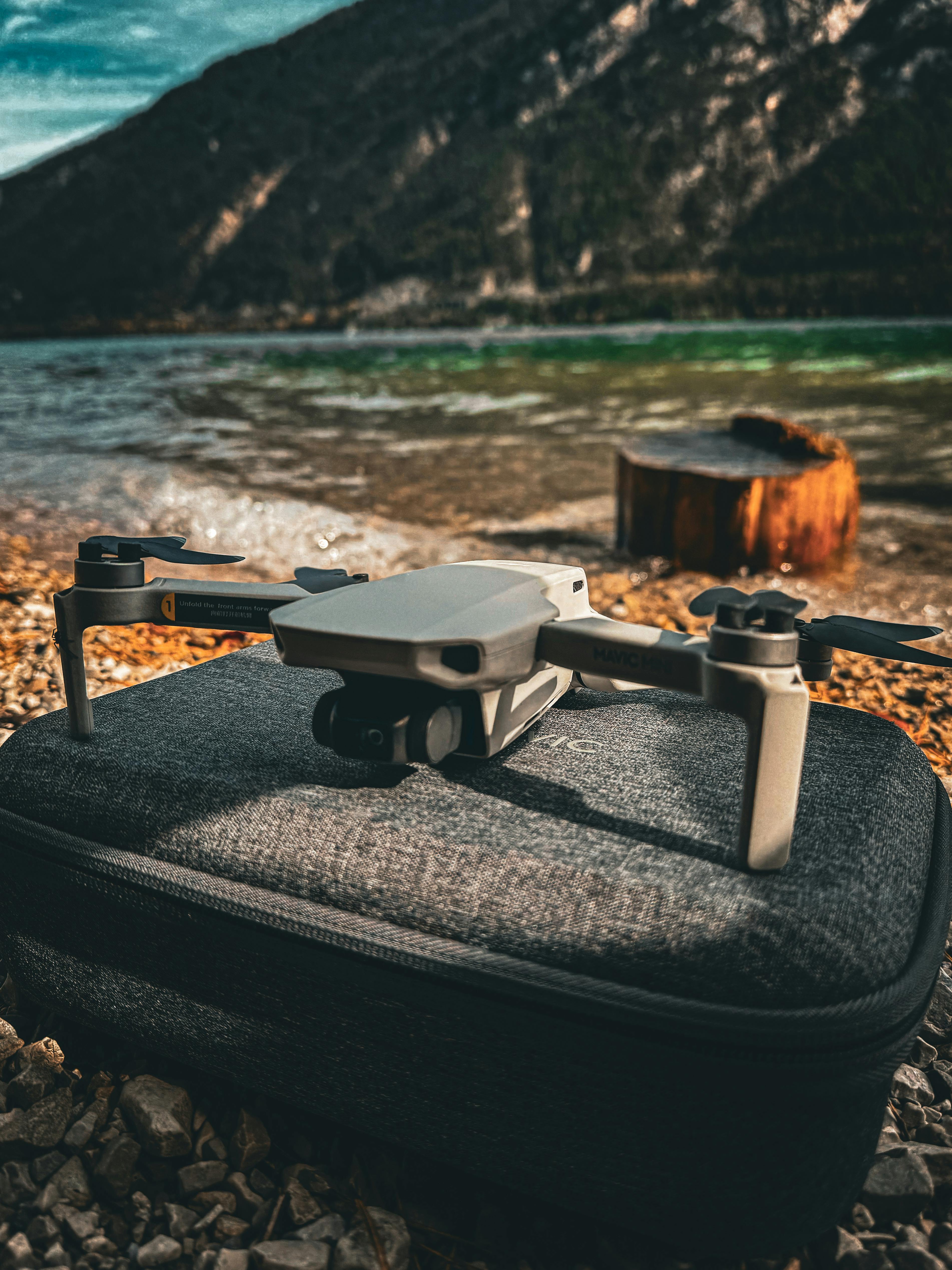 Drone on Rocky Shore of Tyrol Lake in Austria · Free Stock Photo