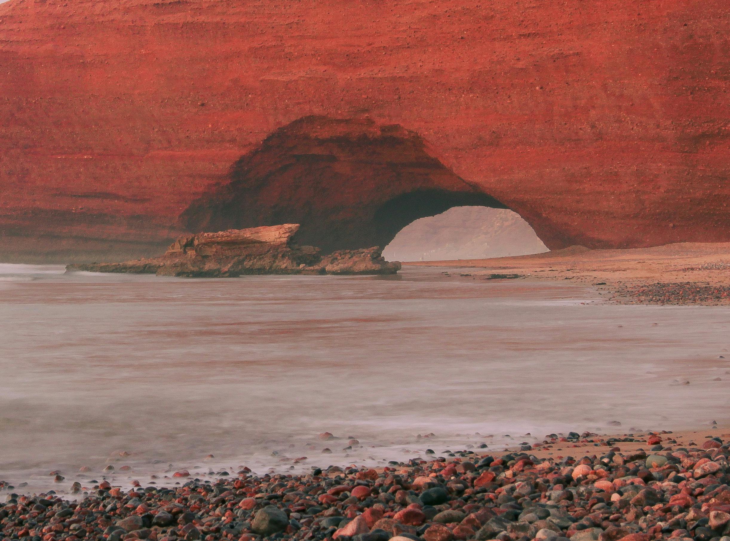 Majestic Red Rock Arch by the Ocean · Free Stock Photo