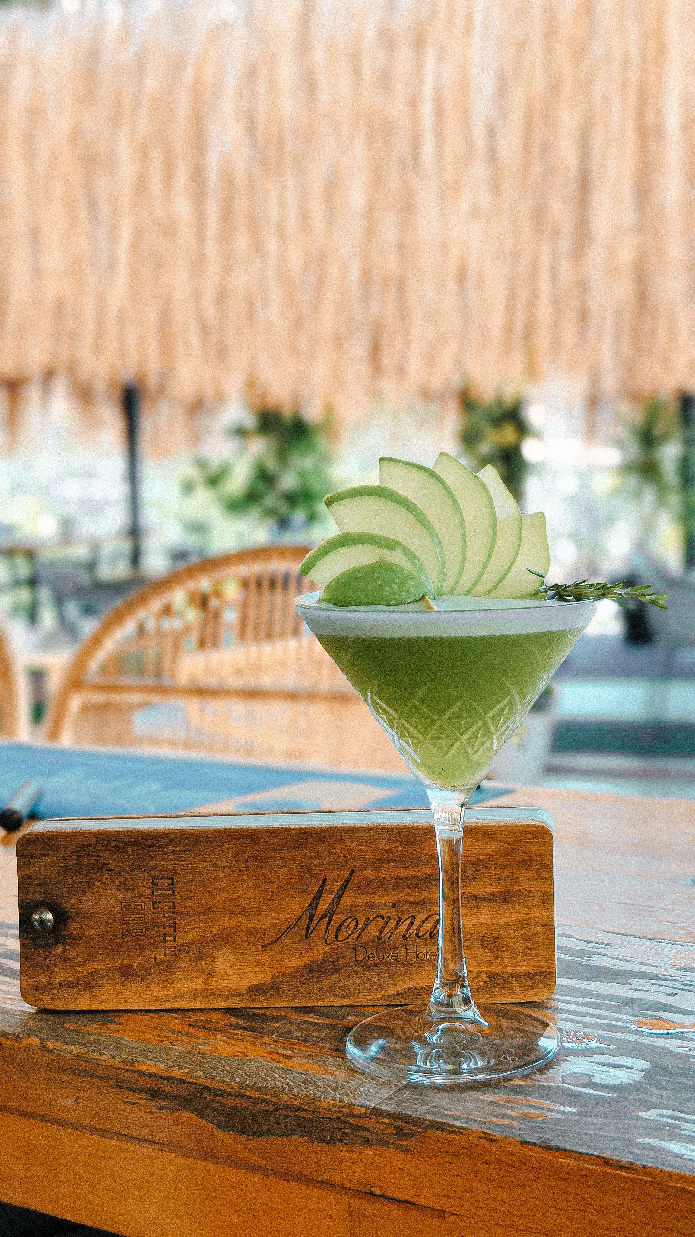 Refreshing Green Cocktail with Apple Garnish · Free Stock Photo