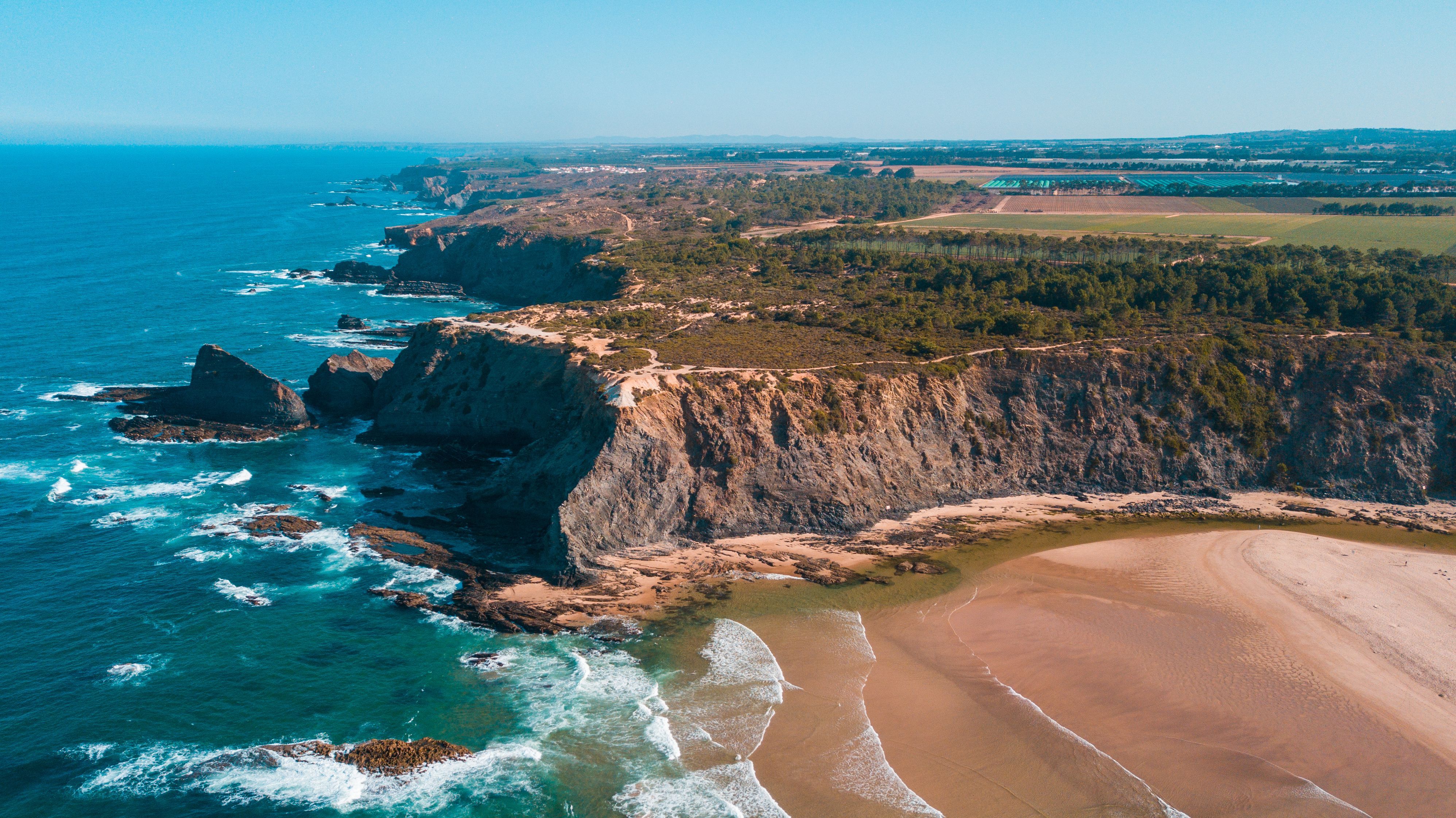 Dramatic Cliffs Overlooking Ocean Views · Free Stock Photo