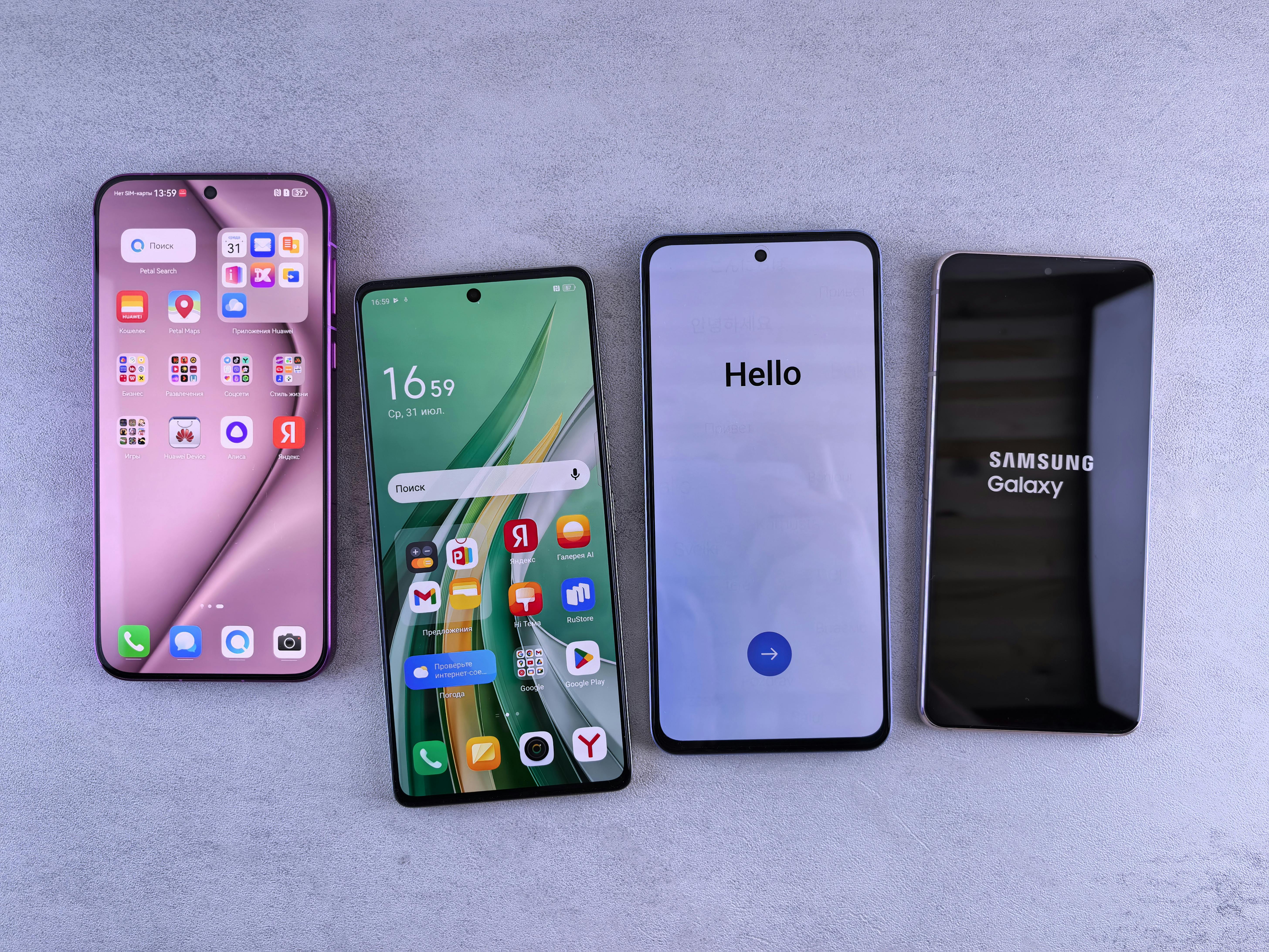 Four Smartphones on Display Showing Various Screens · Free Stock Photo