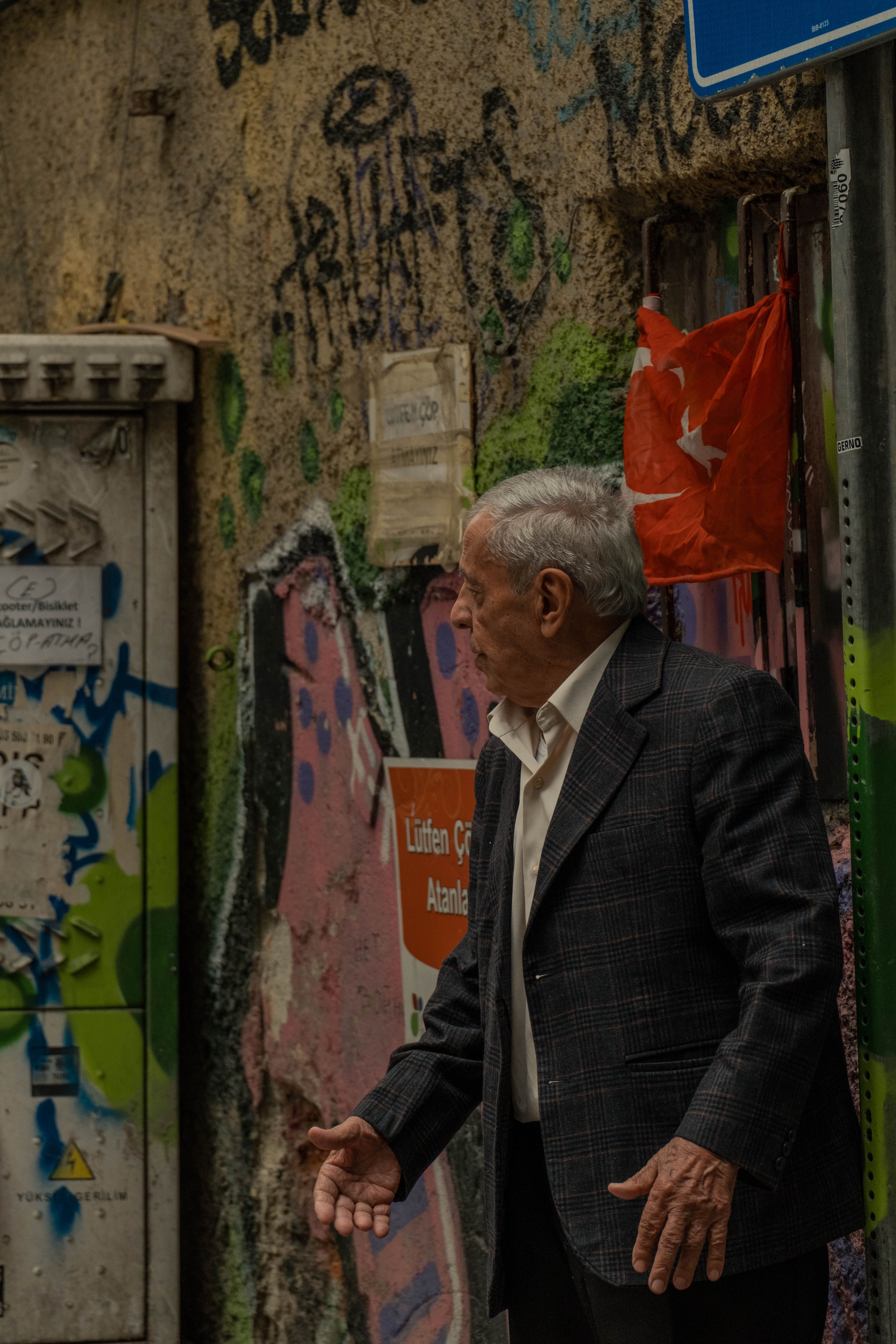 Elderly Man in Istanbul Street with Turkish Flag · Free Stock Photo