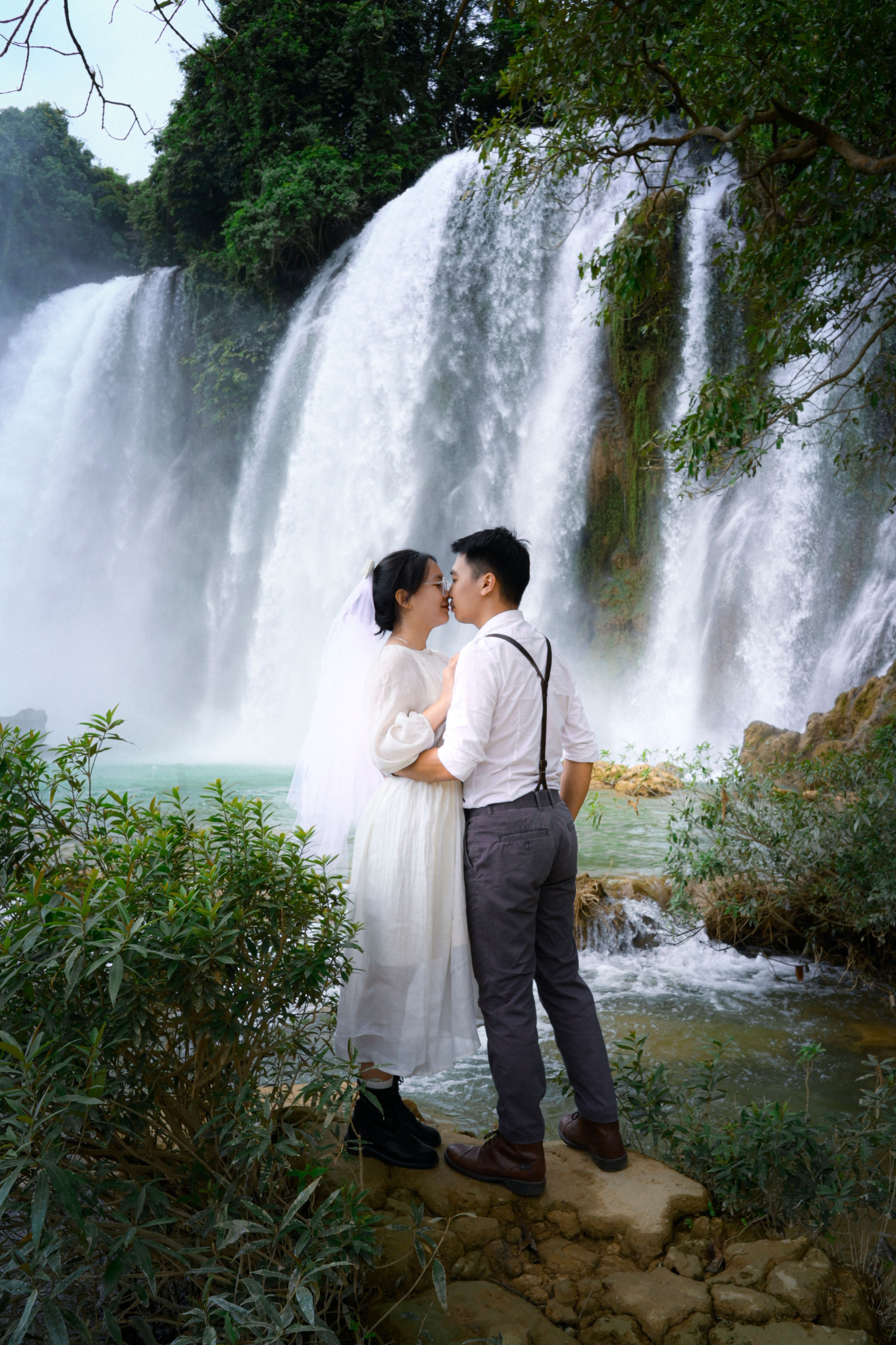 Romantic Couple at Ban Gioc Waterfall · Free Stock Photo
