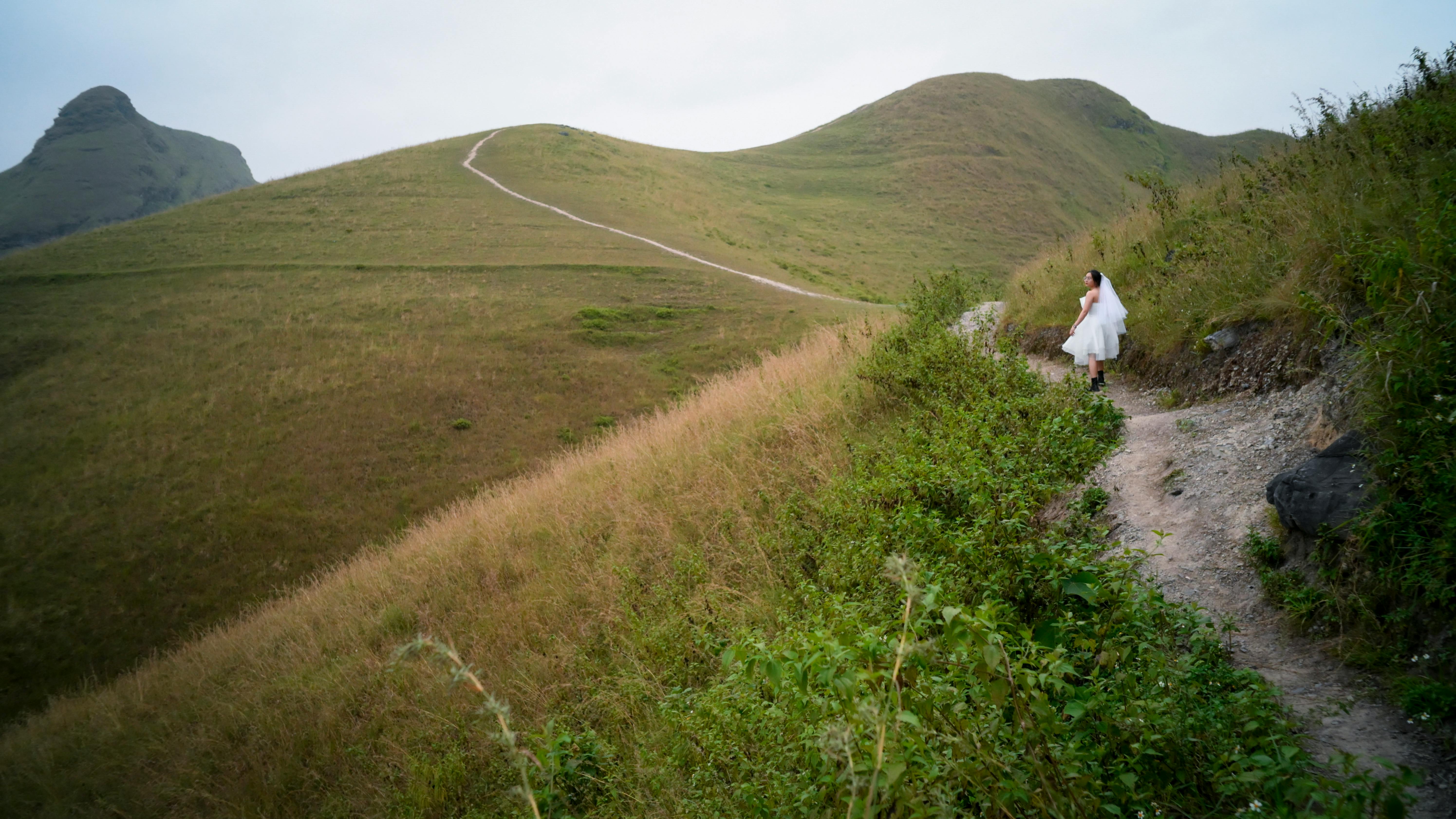 Bride on Serene Hillside Path in Cao Bang · Free Stock Photo