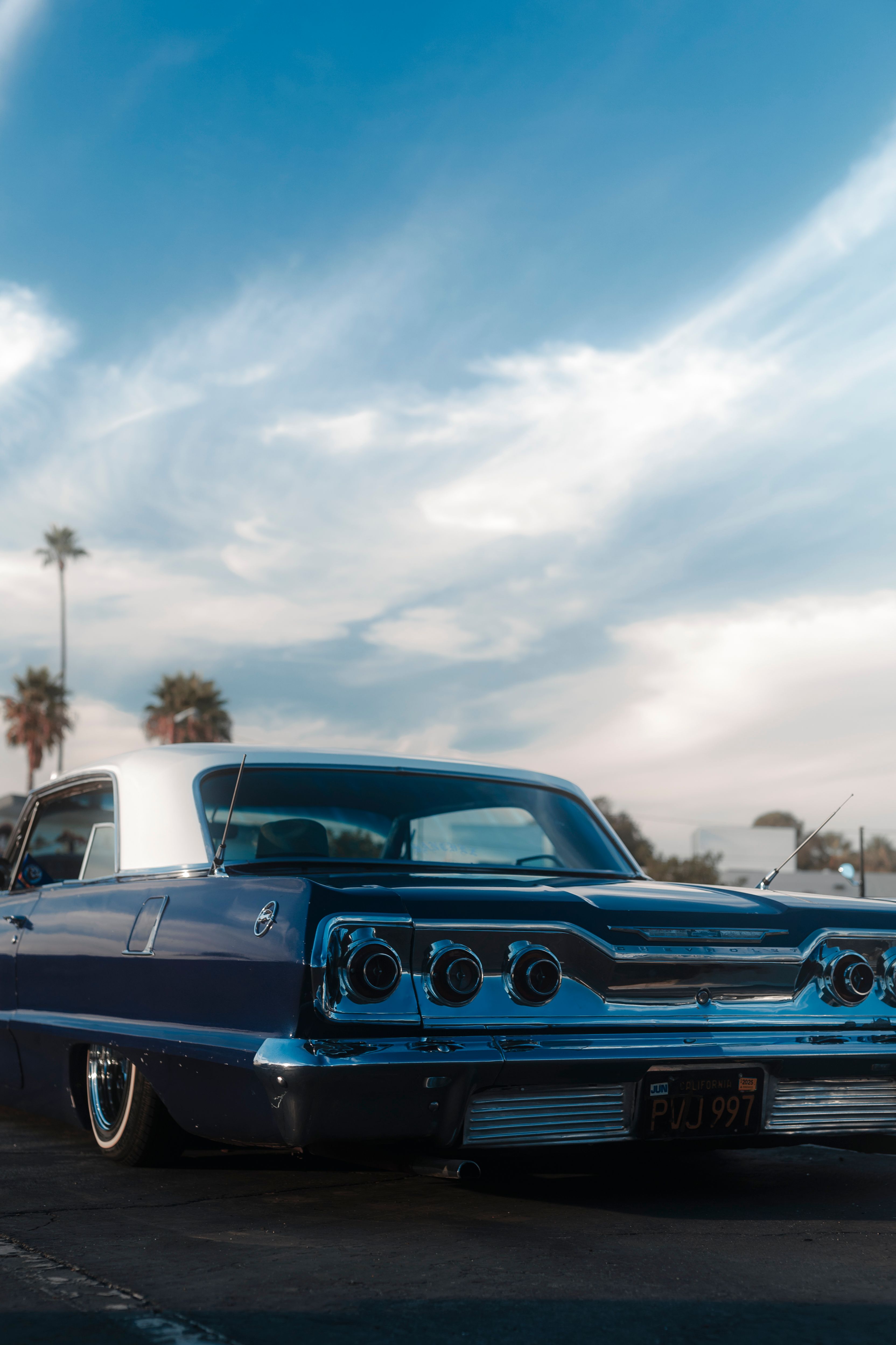 Classic Blue Car on Sunny Day with Palm Trees · Free Stock Photo