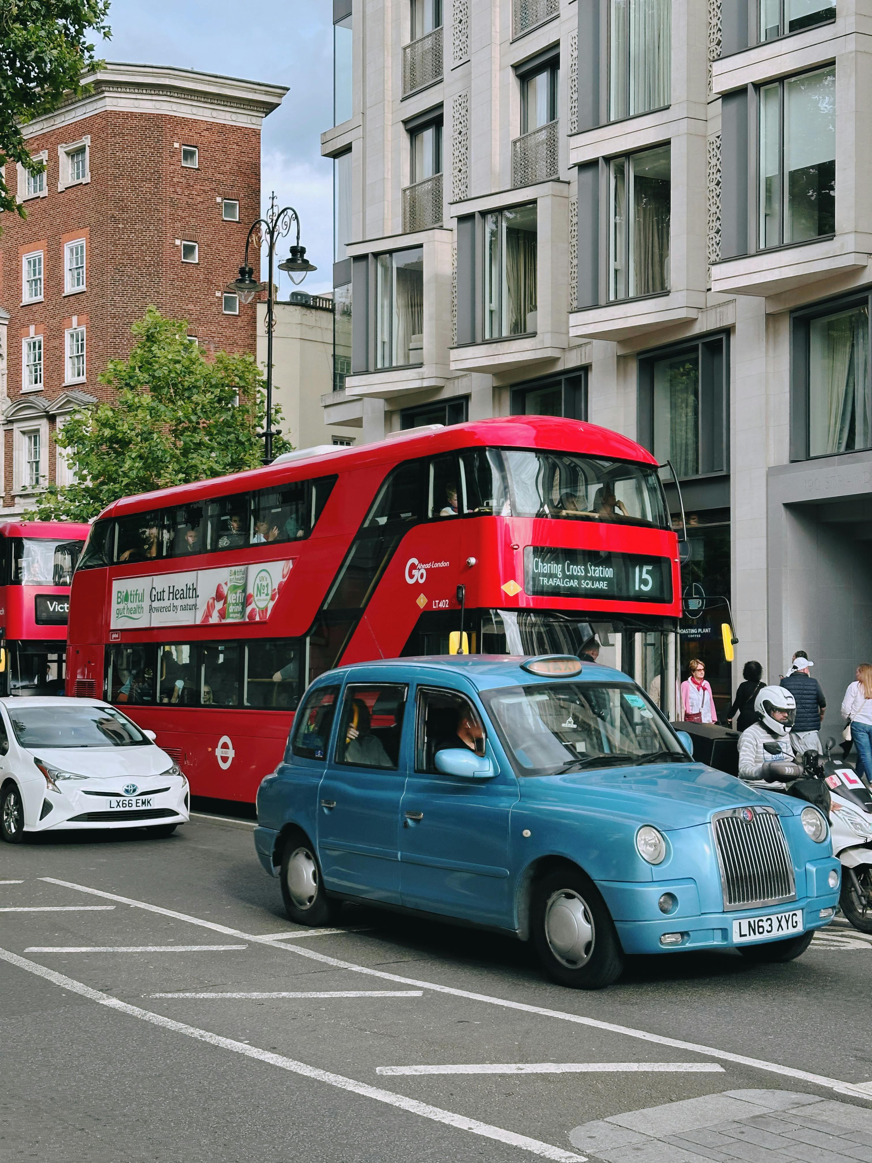 Urban Scene with Iconic London Red Bus · Free Stock Photo