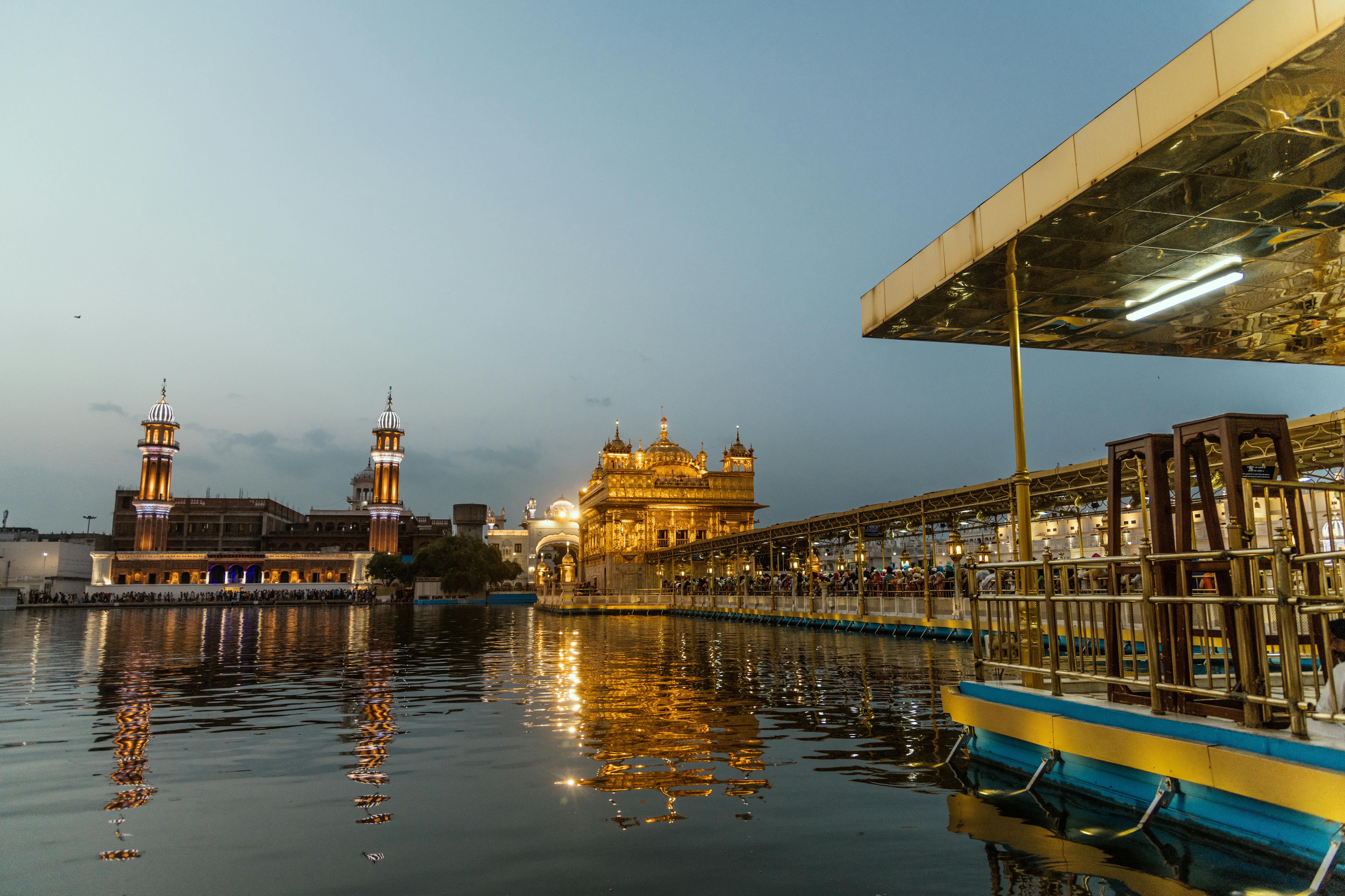 Old temple near water in evening · Free Stock Photo
