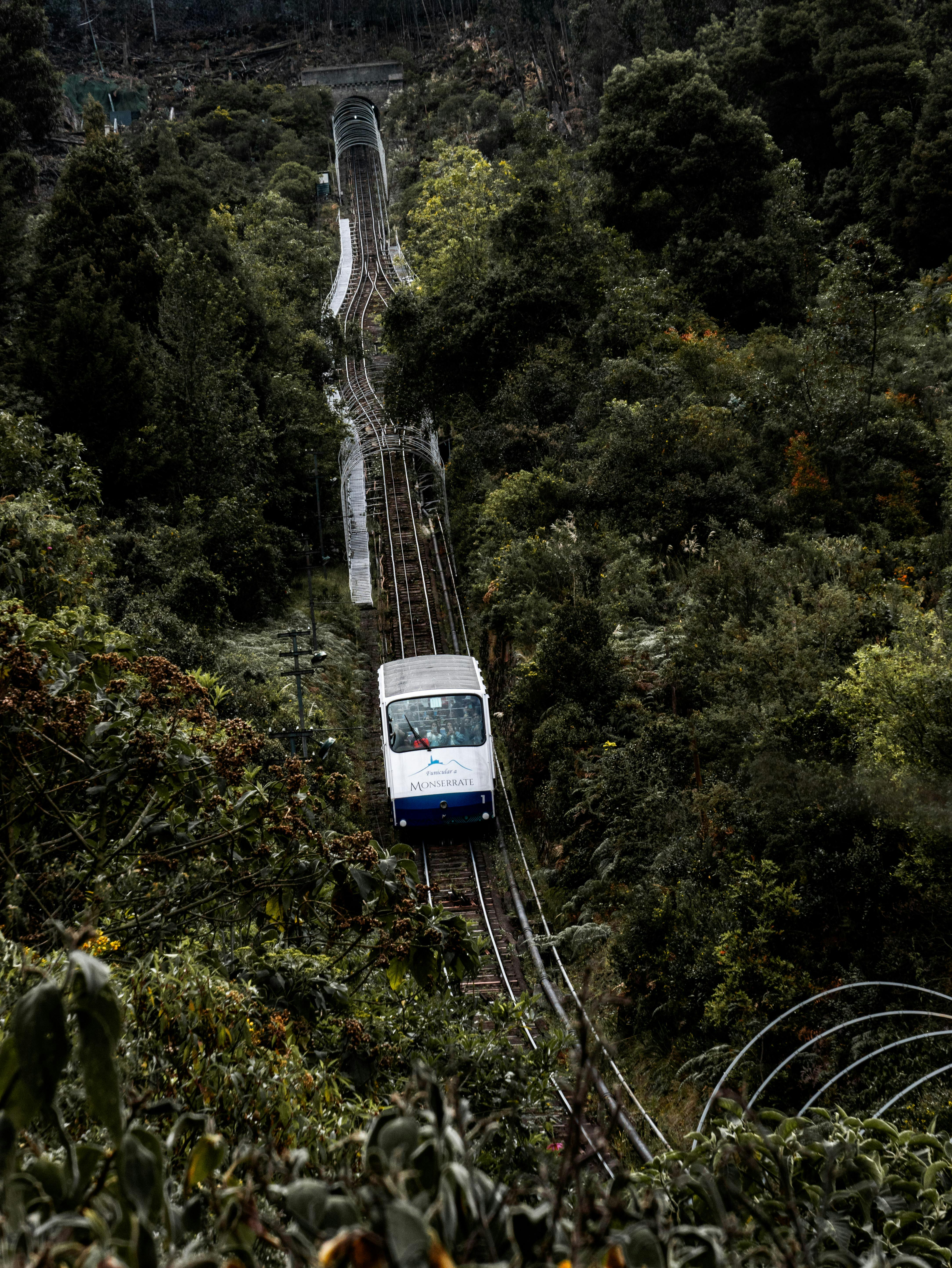 Funicular Descending Amidst Bogotá's Lush Hills · Free Stock Photo