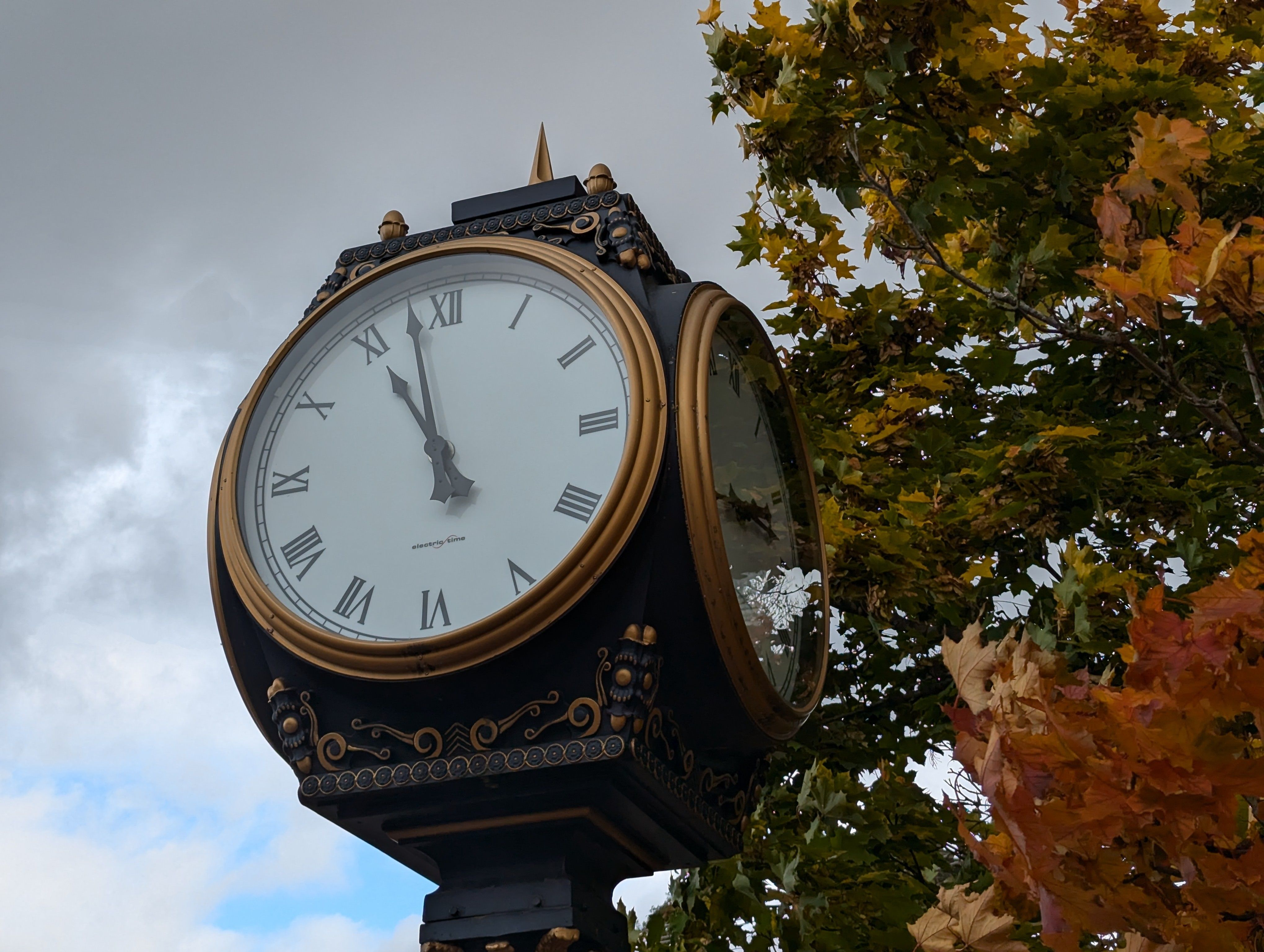 Classic Town Clock Amidst Autumn Foliage · Free Stock Photo