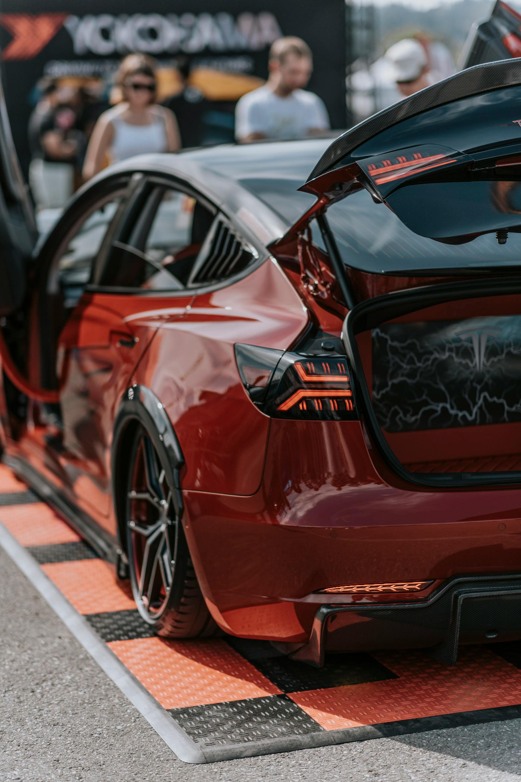 Modified Red Car at Auto Show Event · Free Stock Photo