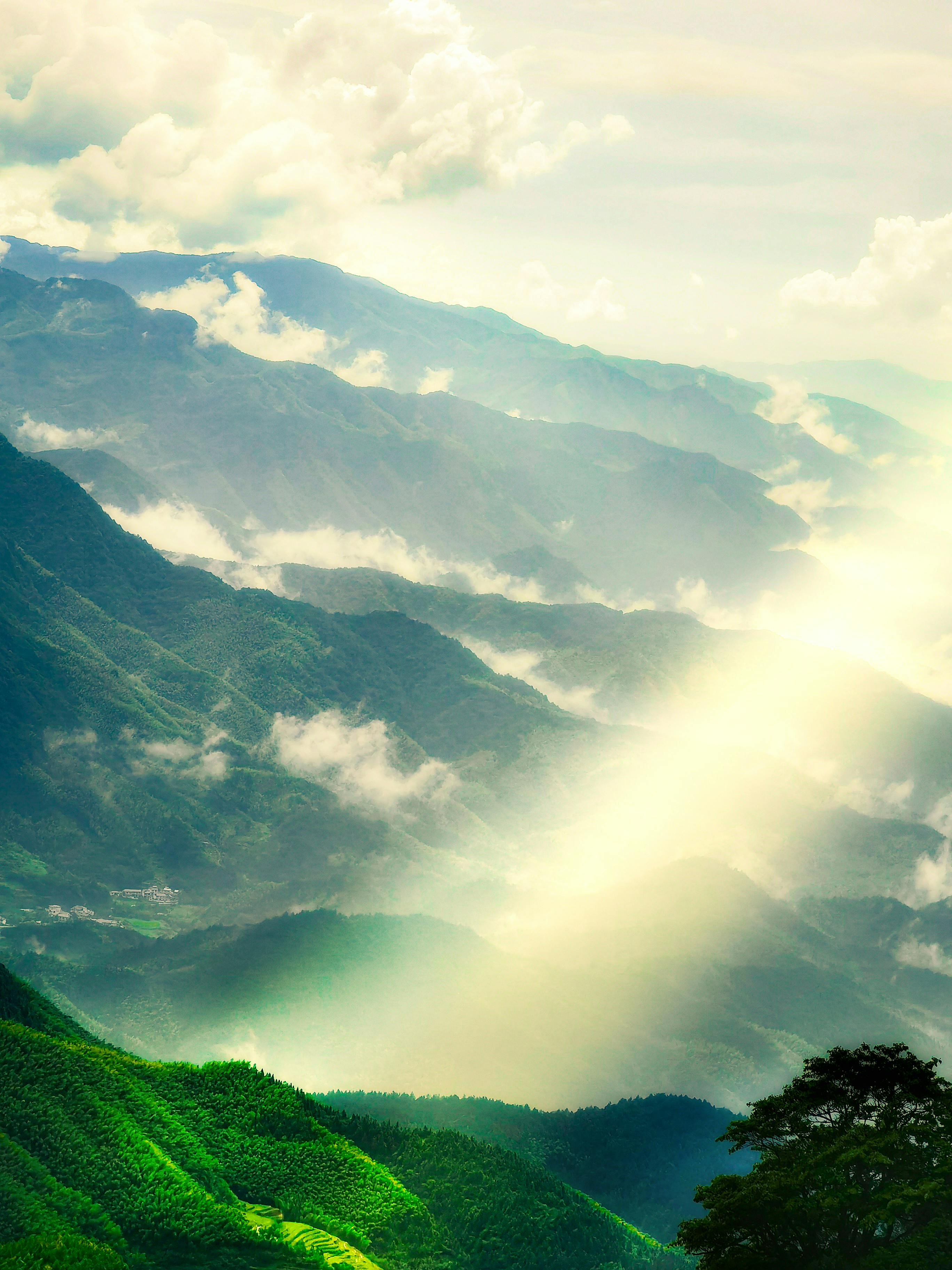 Spectacular Mountain Range with Sun Rays · Free Stock Photo