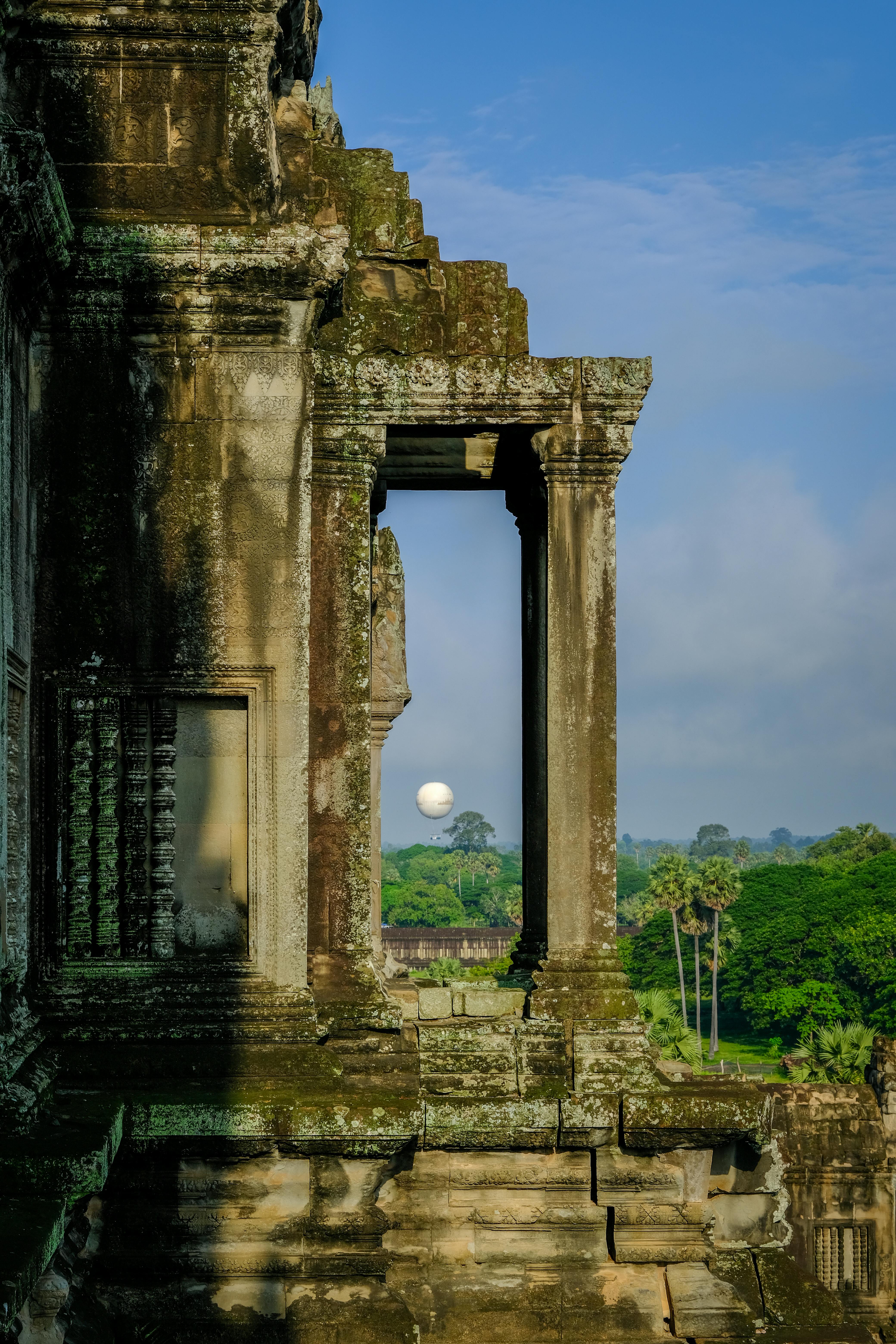 Angkor Wat Temple Framed by Ancient Arch · Free Stock Photo