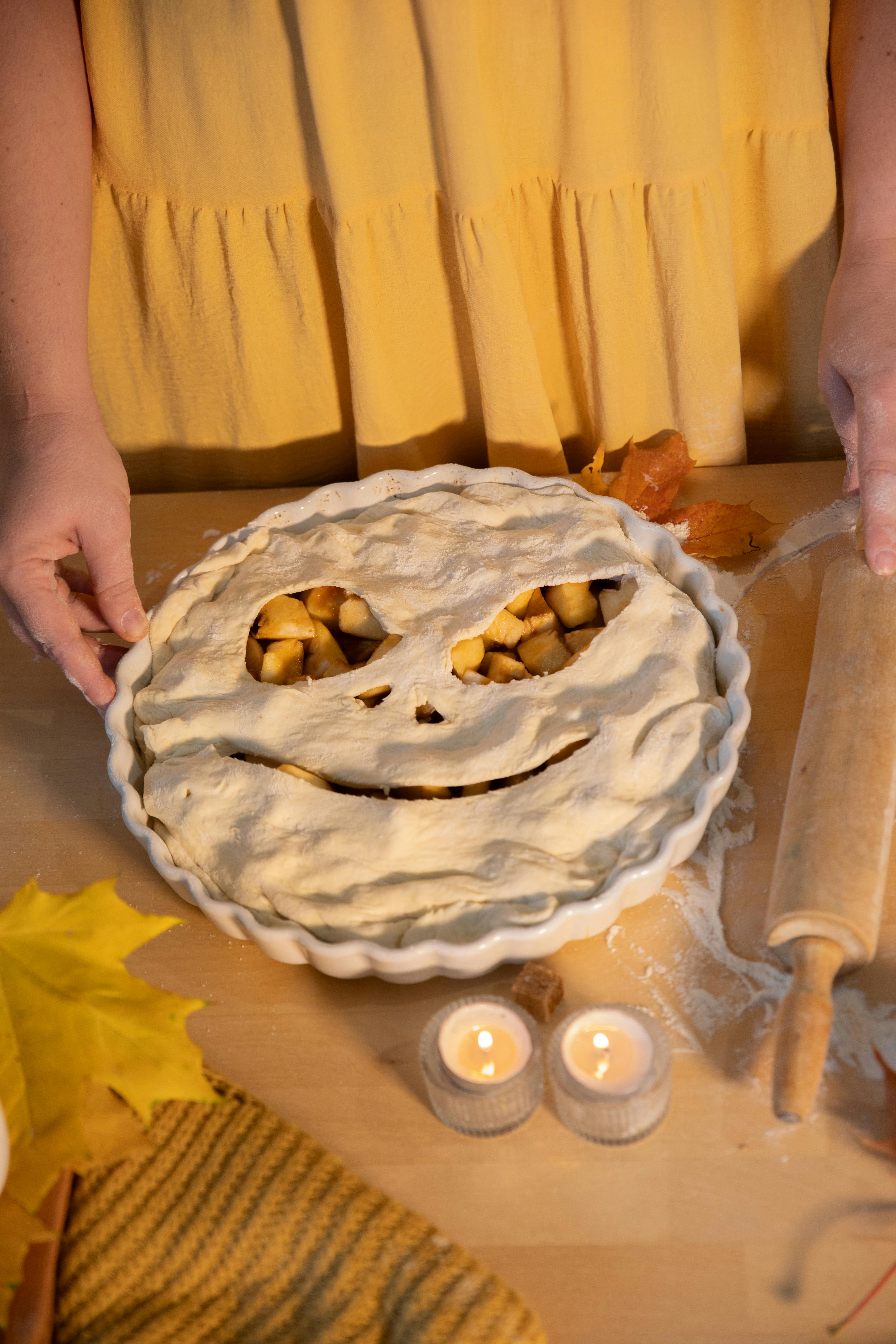 Autumn Apple Pie with Smiling Crust Design · Free Stock Photo