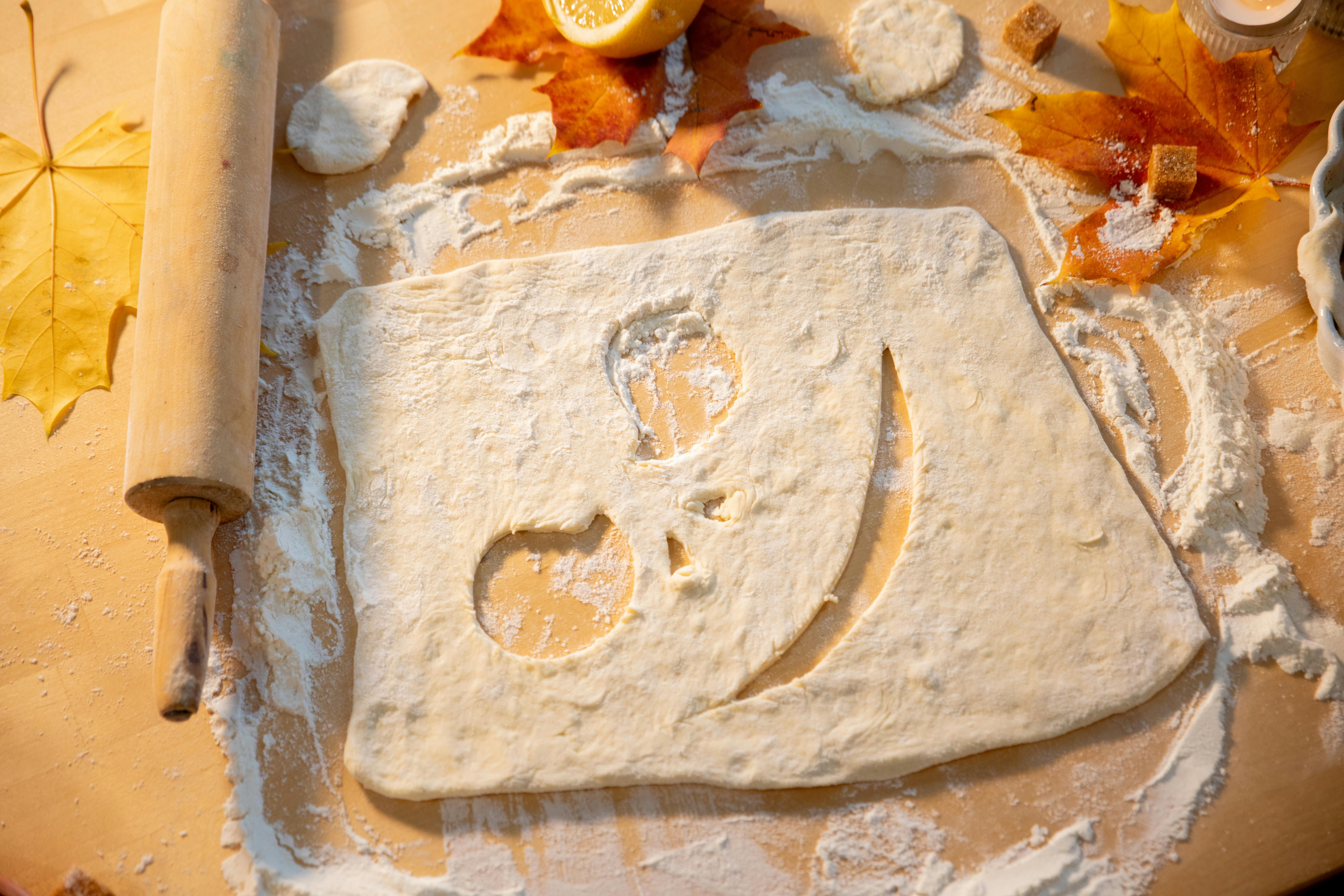 Autumn Baking: Dough with Smiley Face Design · Free Stock Photo
