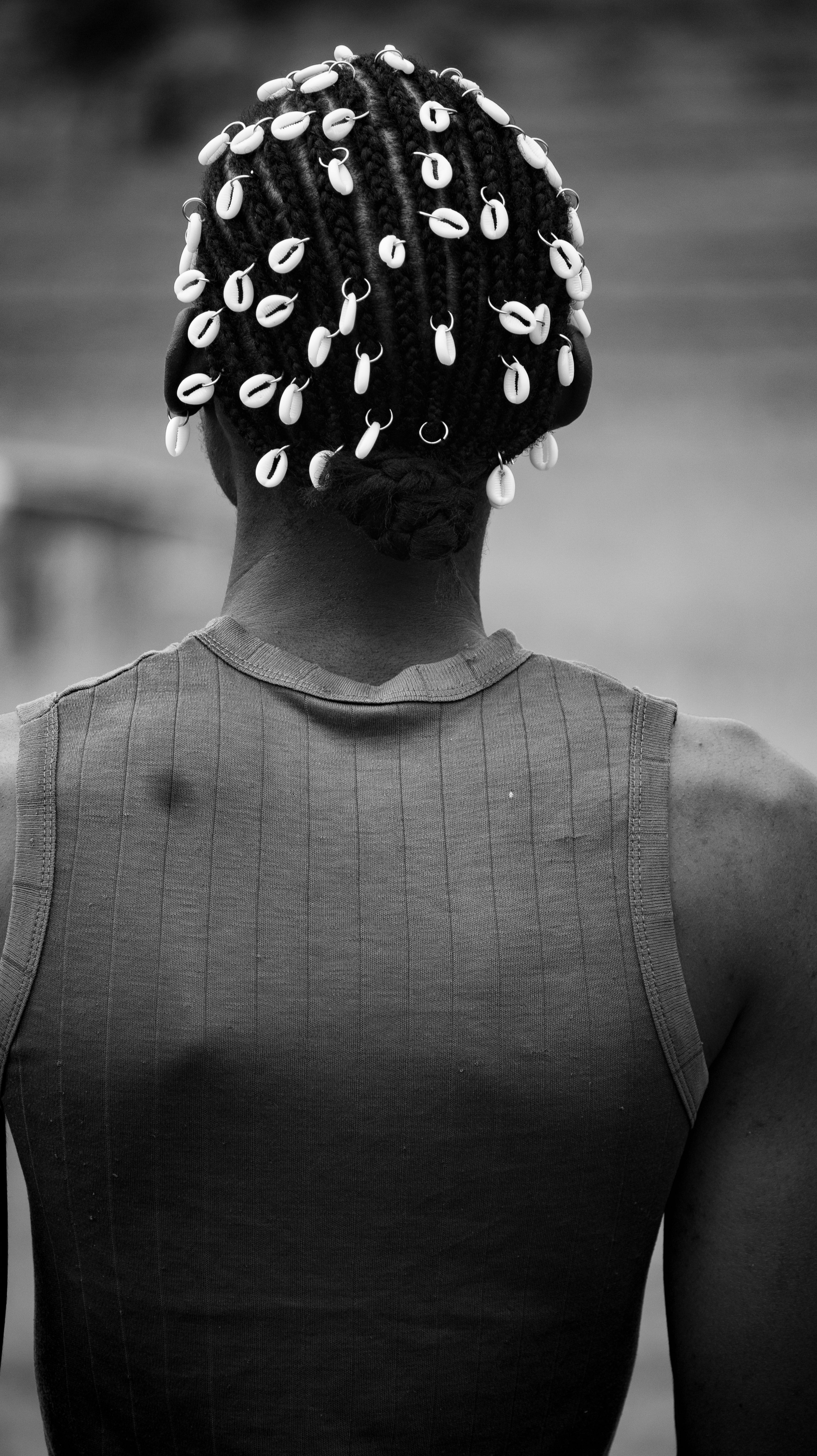 Person with Unique Hairstyle Featuring Shells · Free Stock Photo