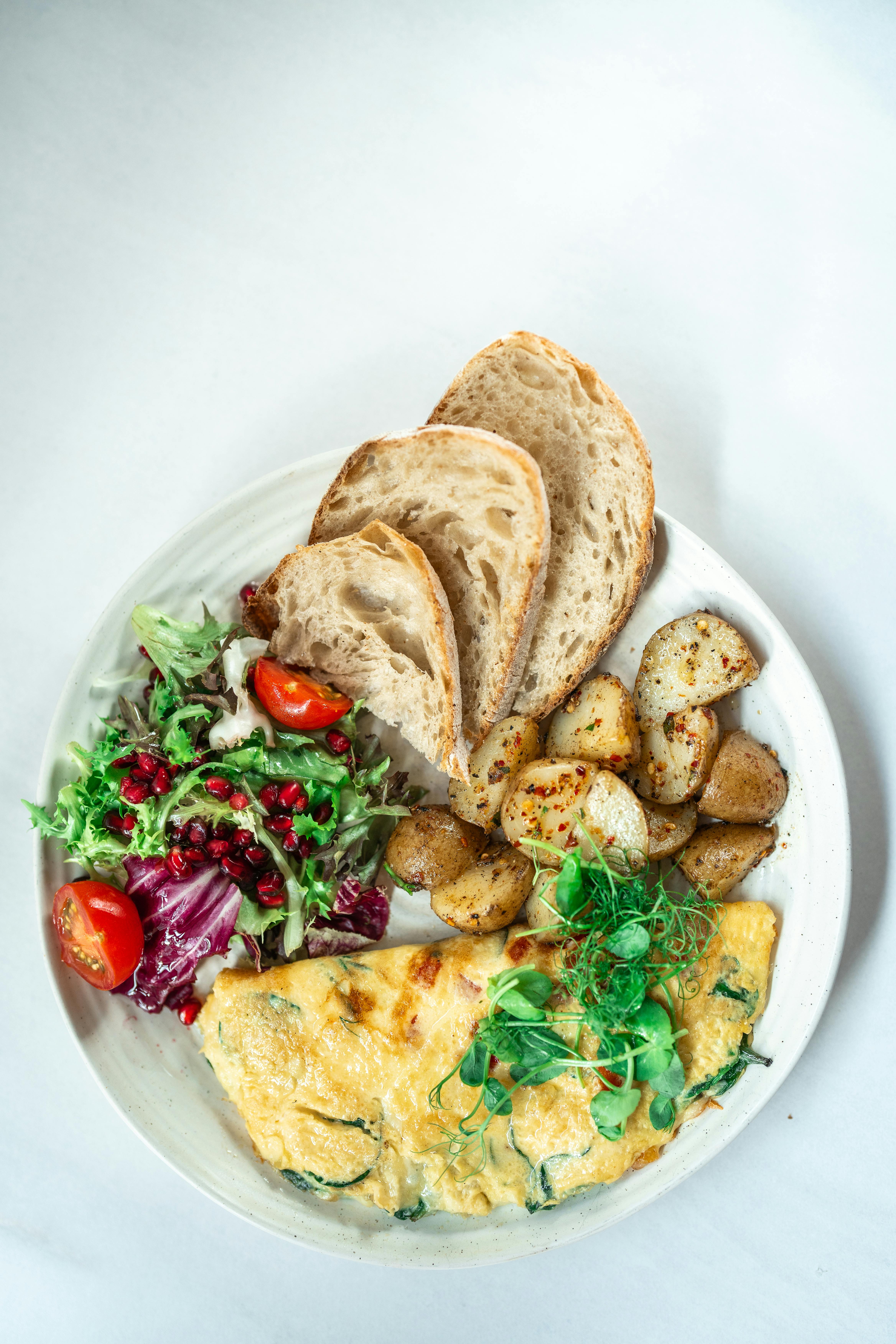 Healthy Breakfast Plate with Omelette and Salad · Free Stock Photo