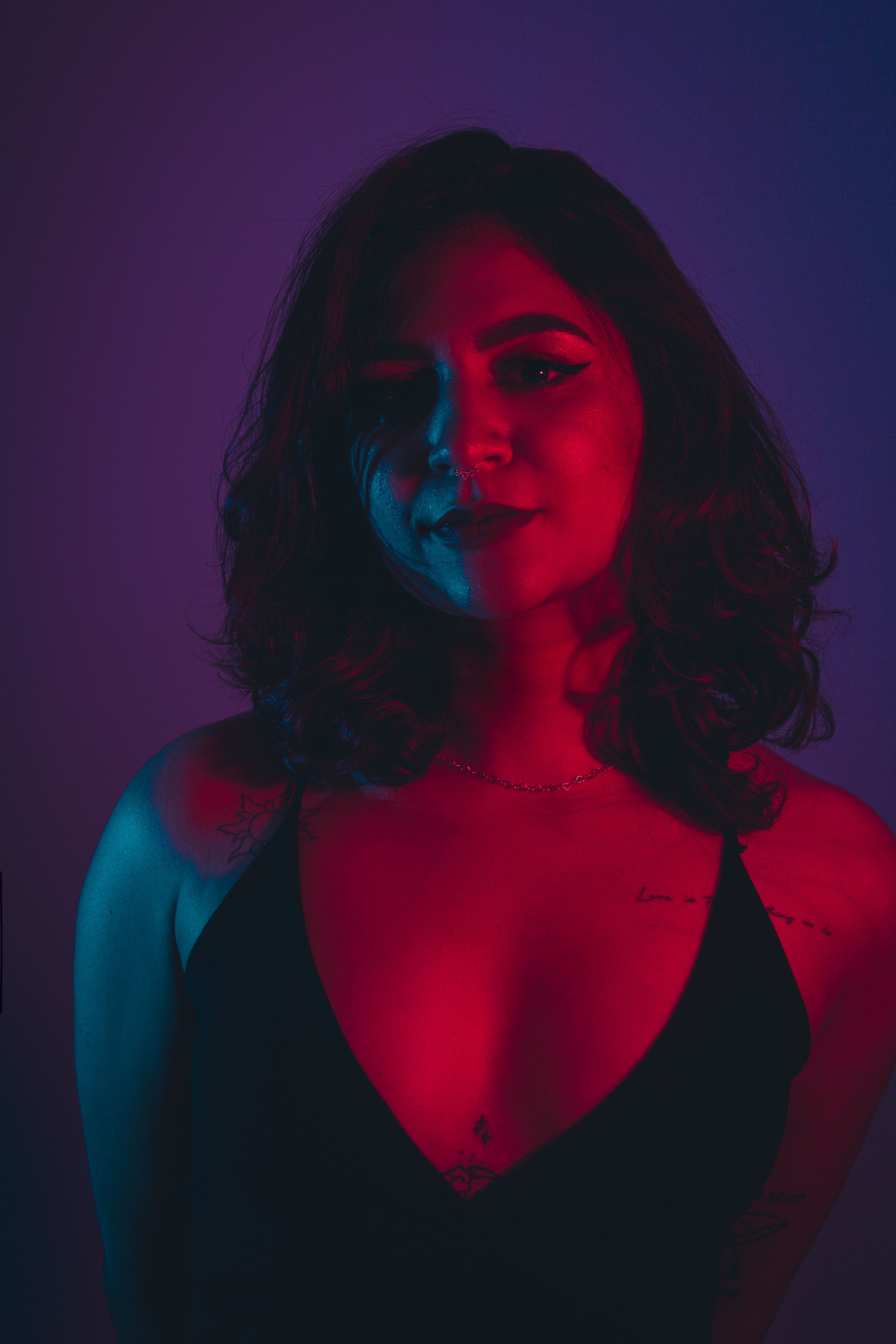 Dramatic Portrait with Red and Blue Lighting · Free Stock Photo