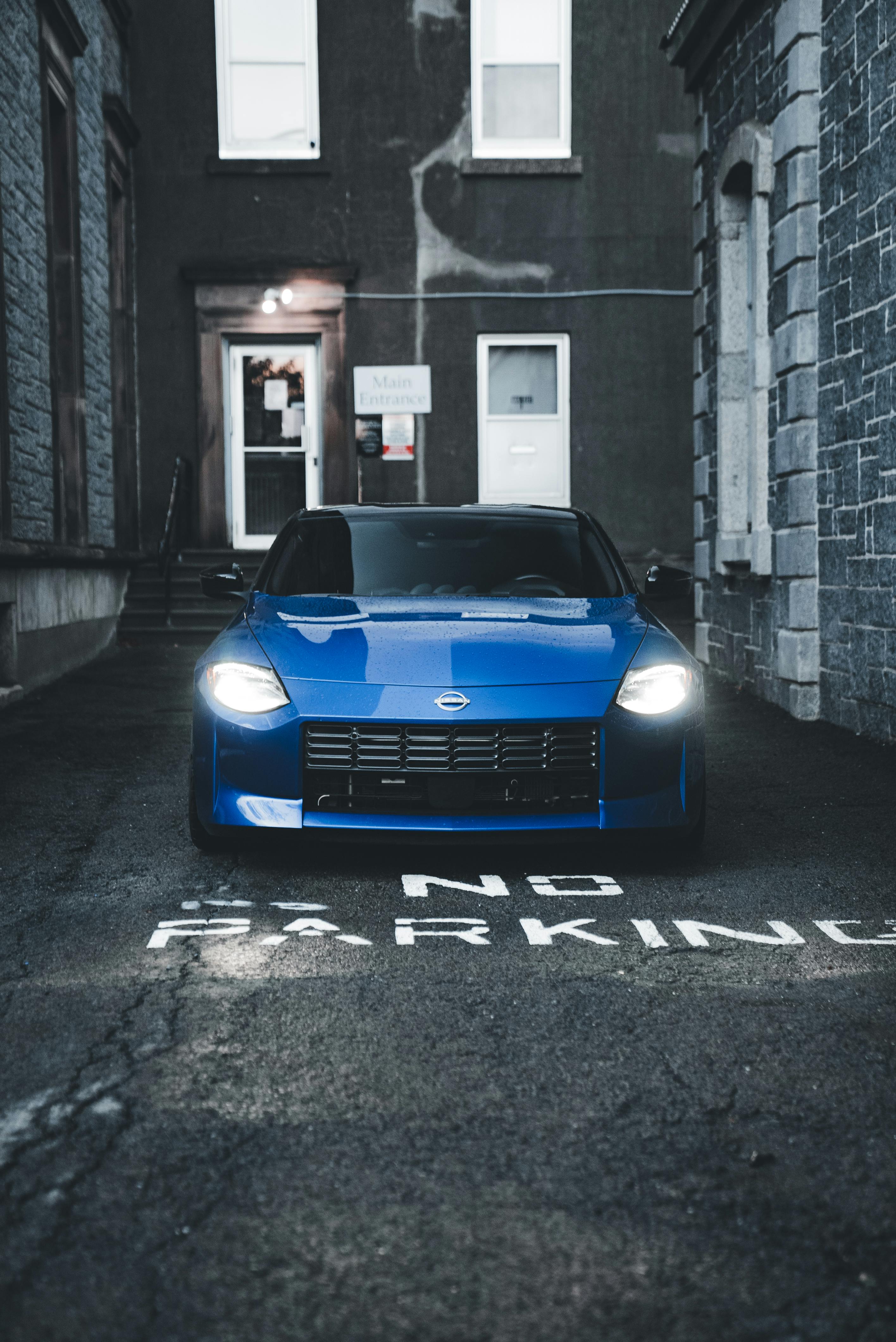 Bright Blue Car in Urban Alley at Night · Free Stock Photo