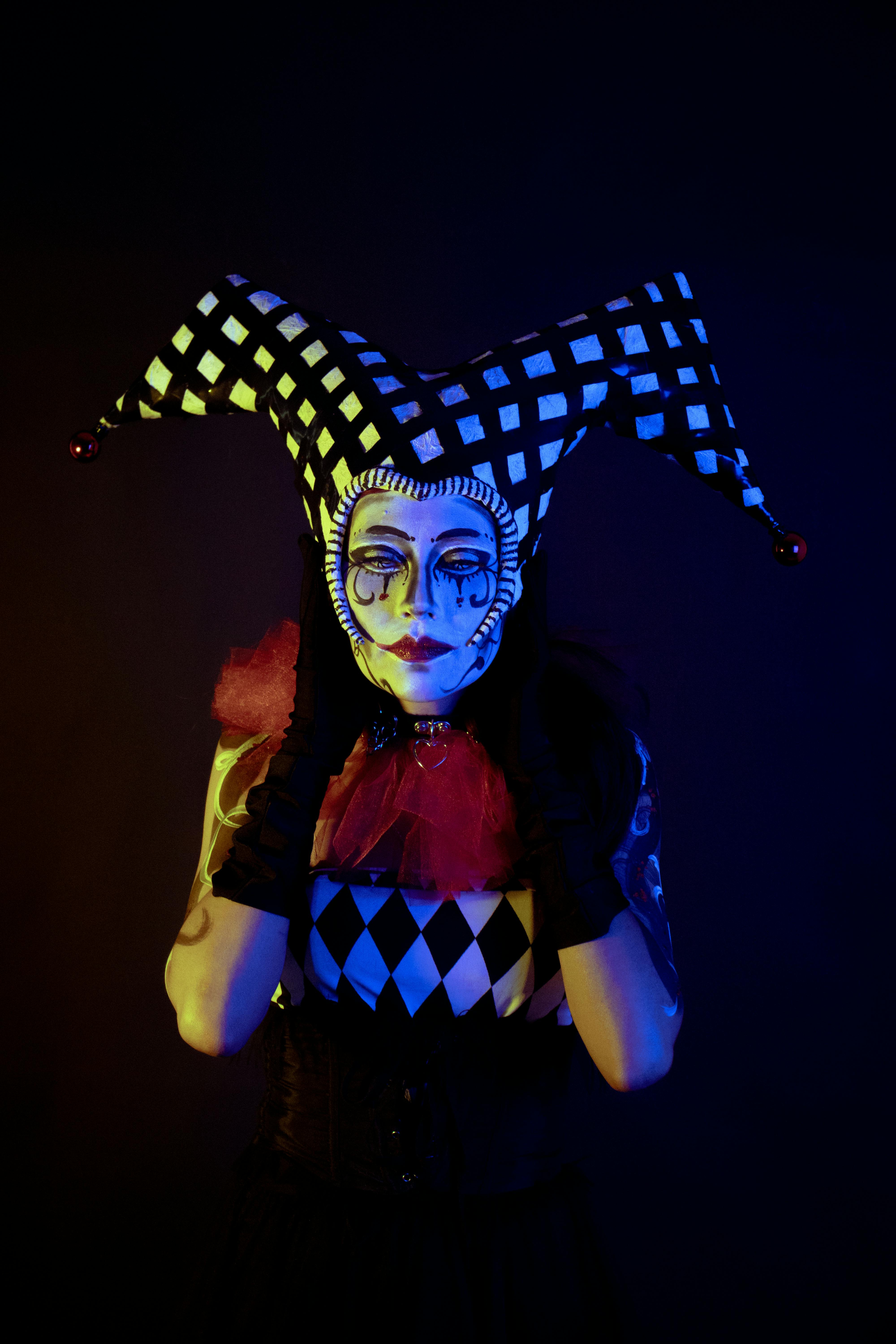 Dramatic Jester in Artistic Costume and Makeup · Free Stock Photo