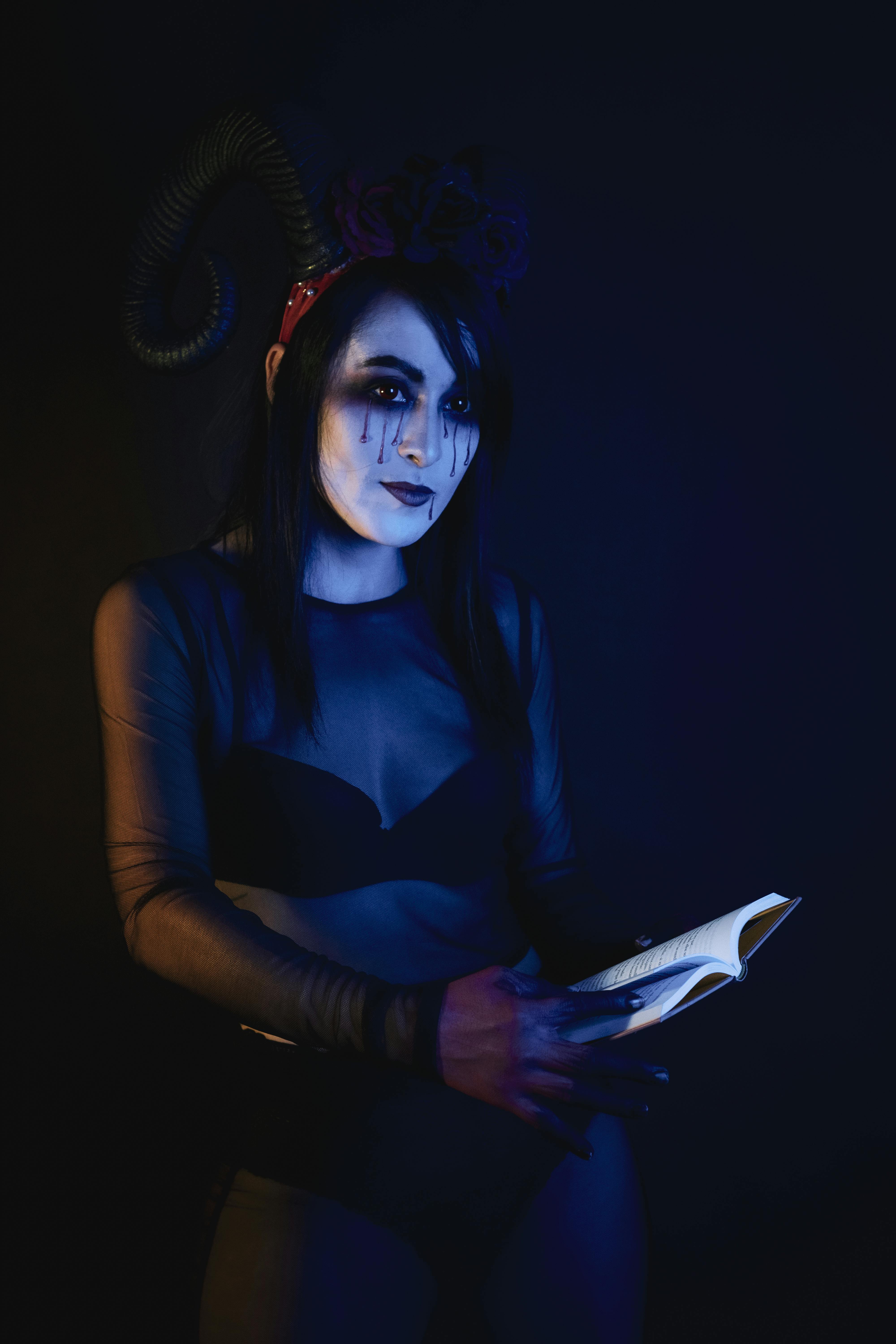 Dramatic Halloween Portrait with Horned Costume · Free Stock Photo