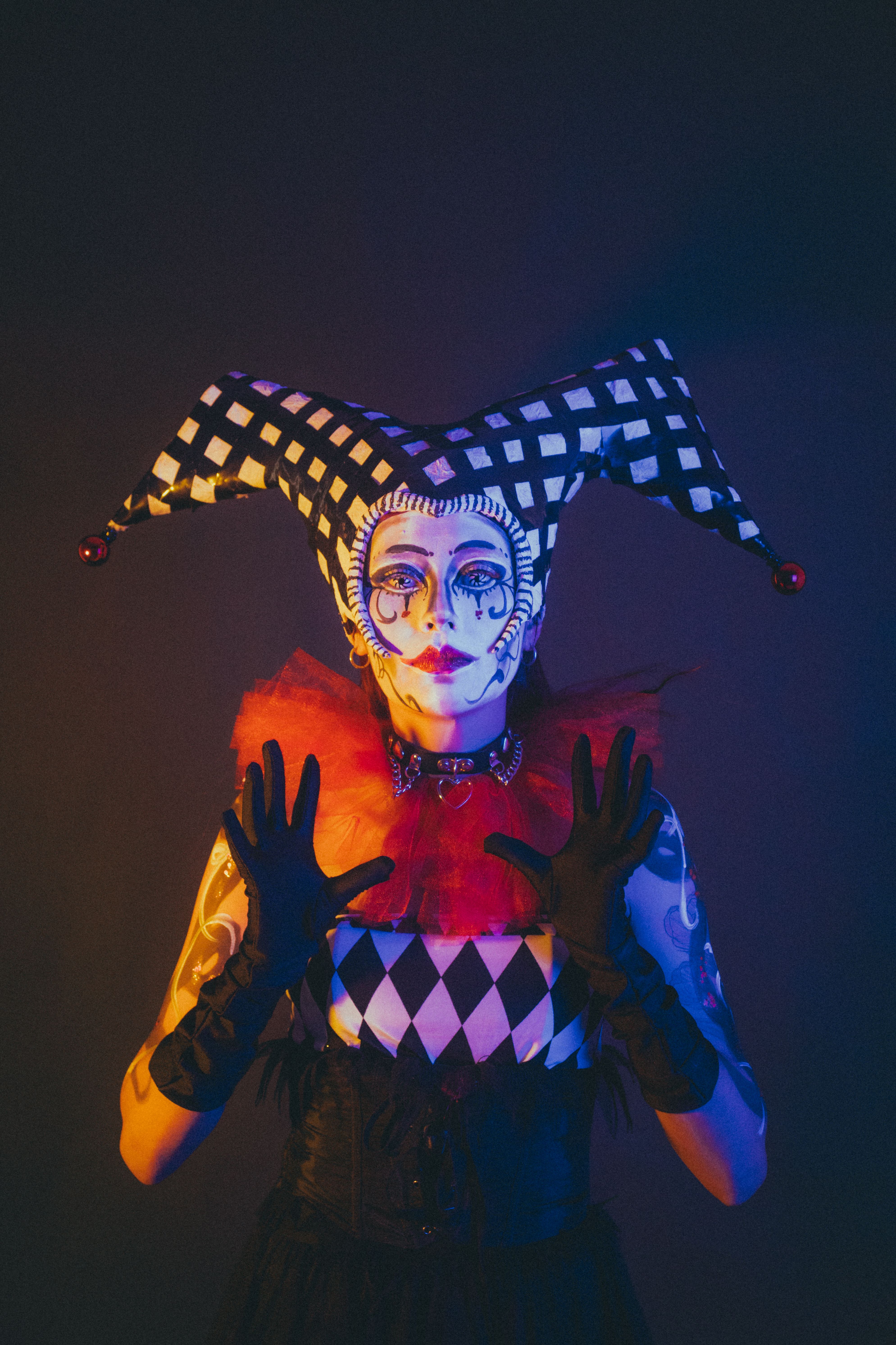Eccentric Jester in Halloween Costume Portrait · Free Stock Photo