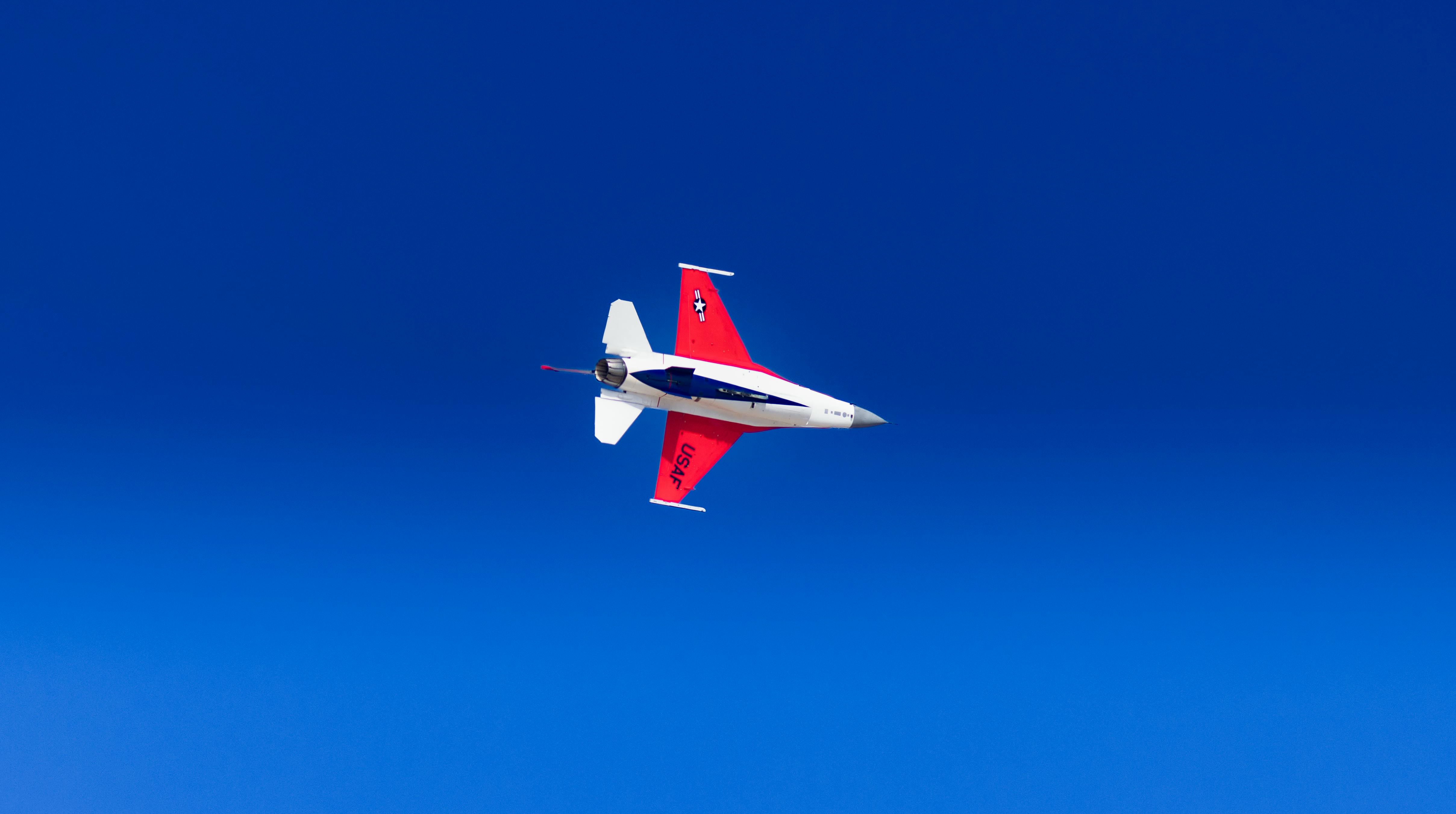 Dynamic Jet Performing Aerial Maneuvers · Free Stock Photo
