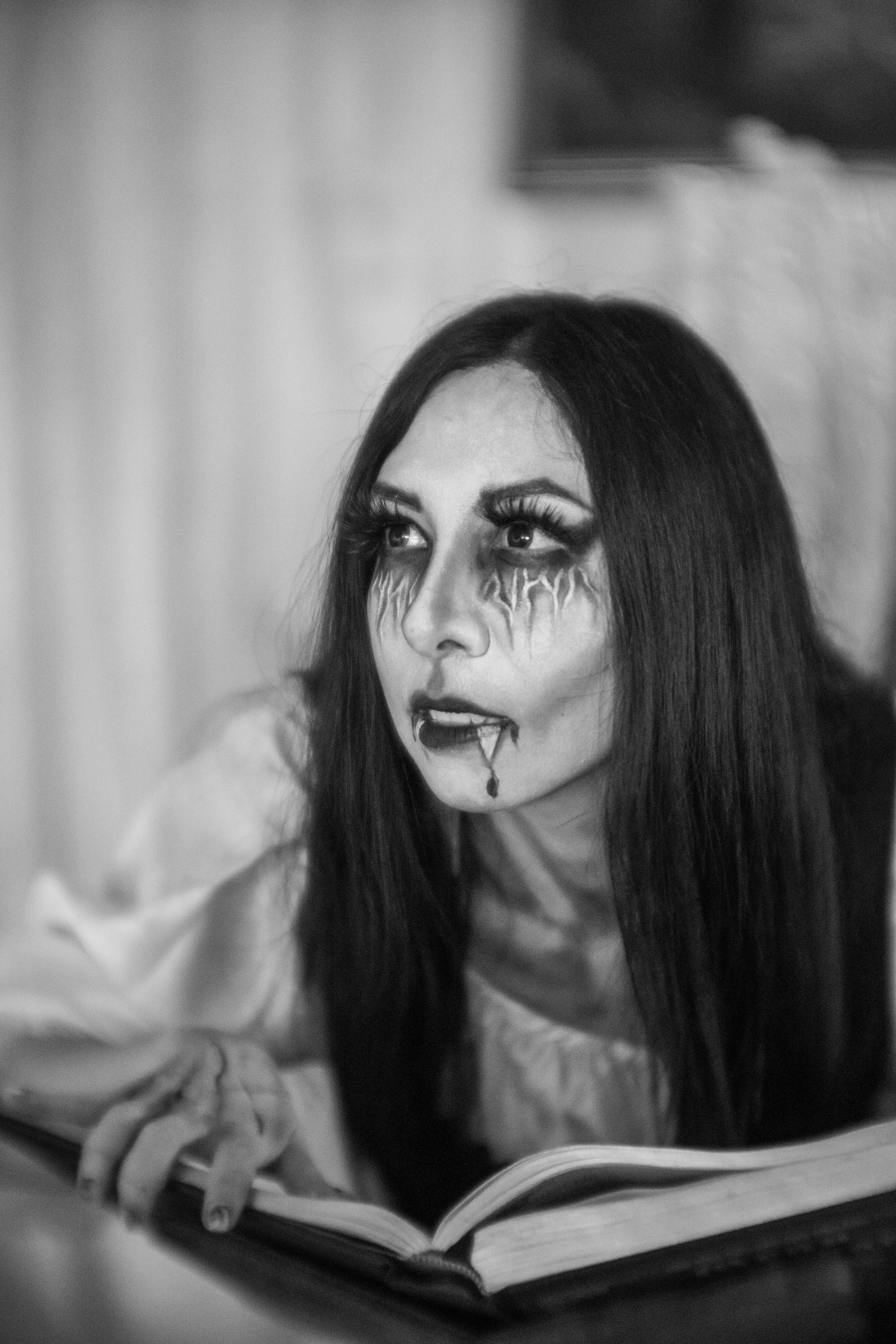 Horror-Themed Portrait of Woman with Creepy Makeup · Free Stock Photo