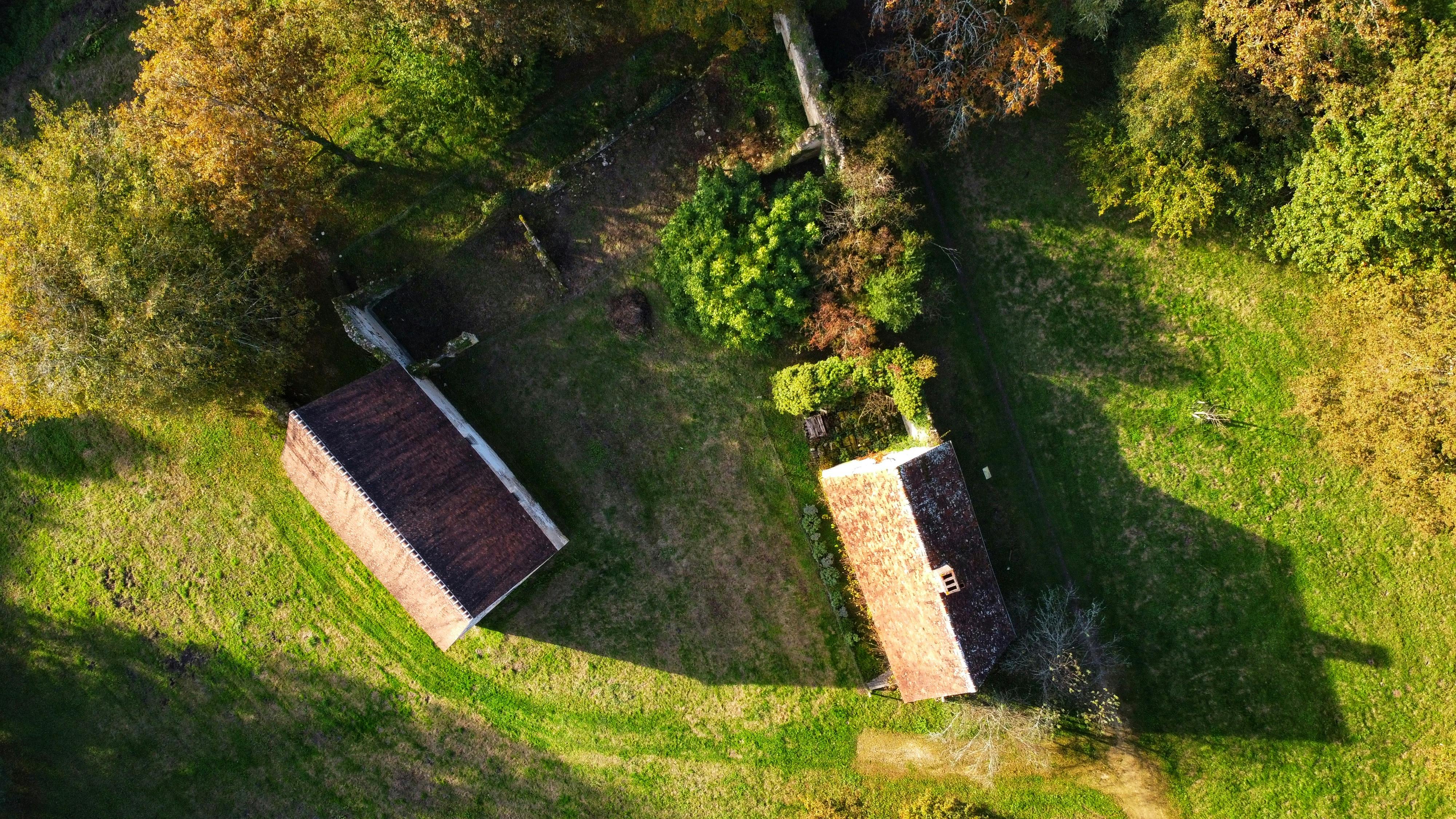 Aerial View of Autumnal French Countryside Buildings · Free Stock Photo