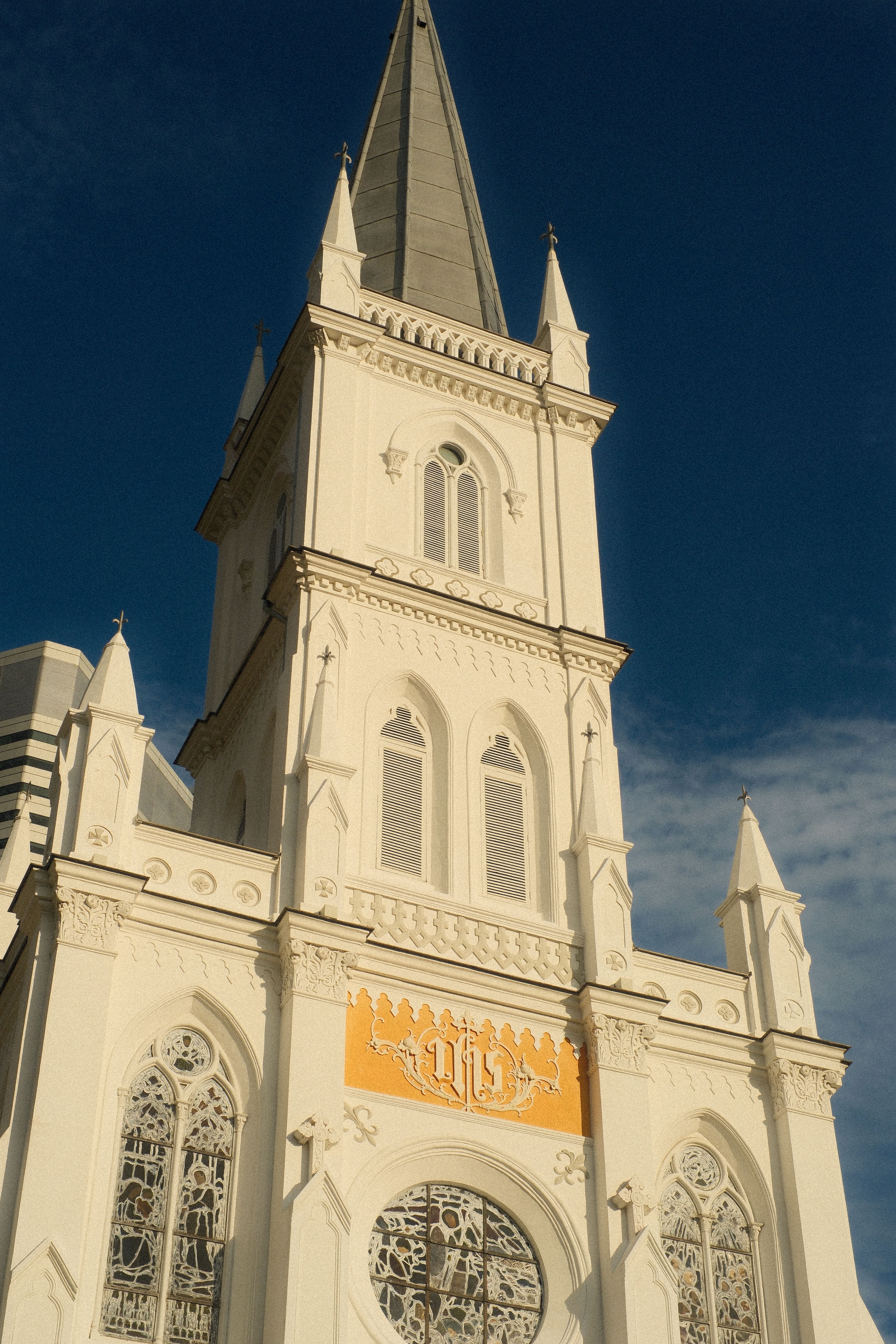 Gothic Revival Church Tower Against Blue Sky · Free Stock Photo