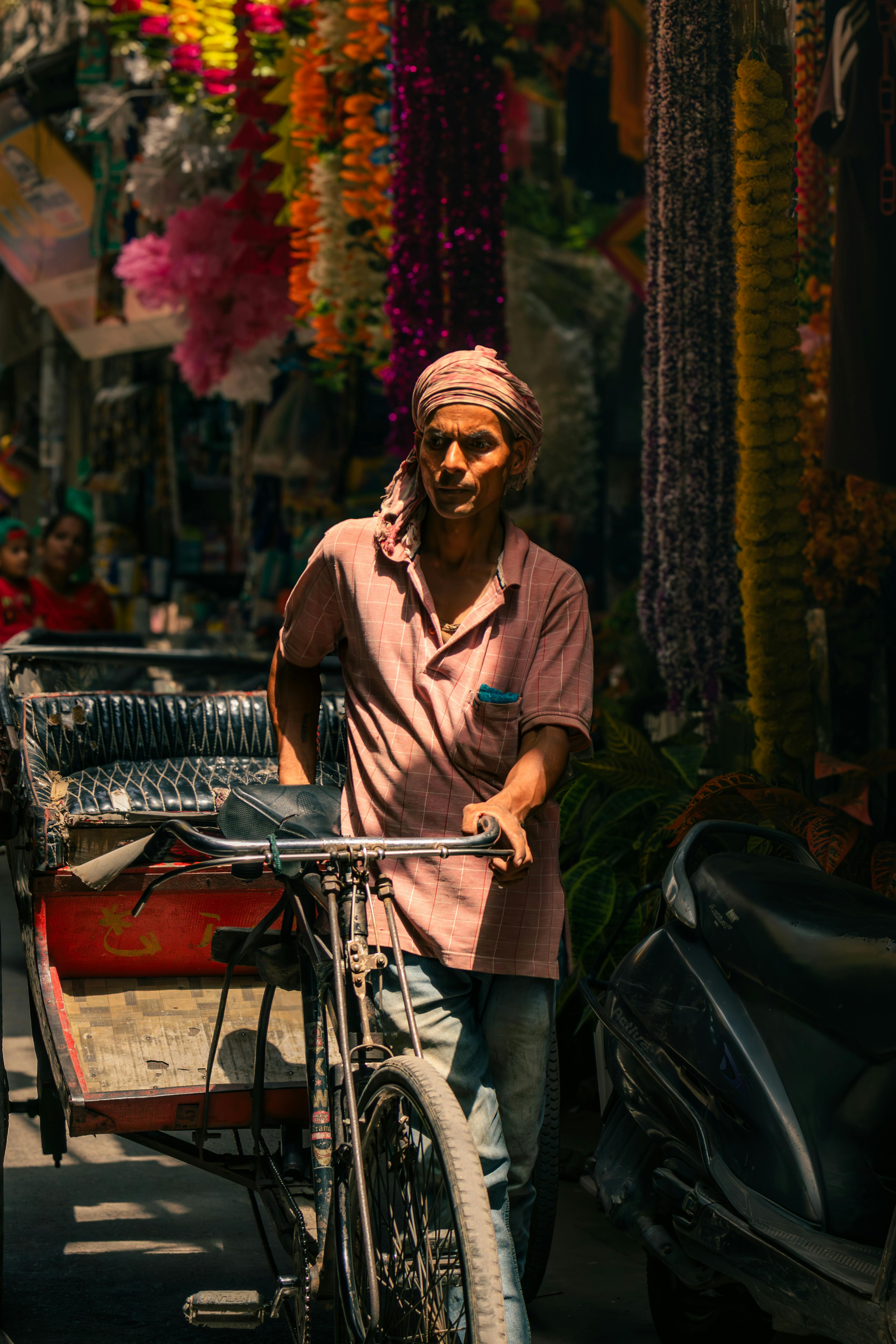 Rickshaw Puller on Vibrant Jalandhar Street · Free Stock Photo