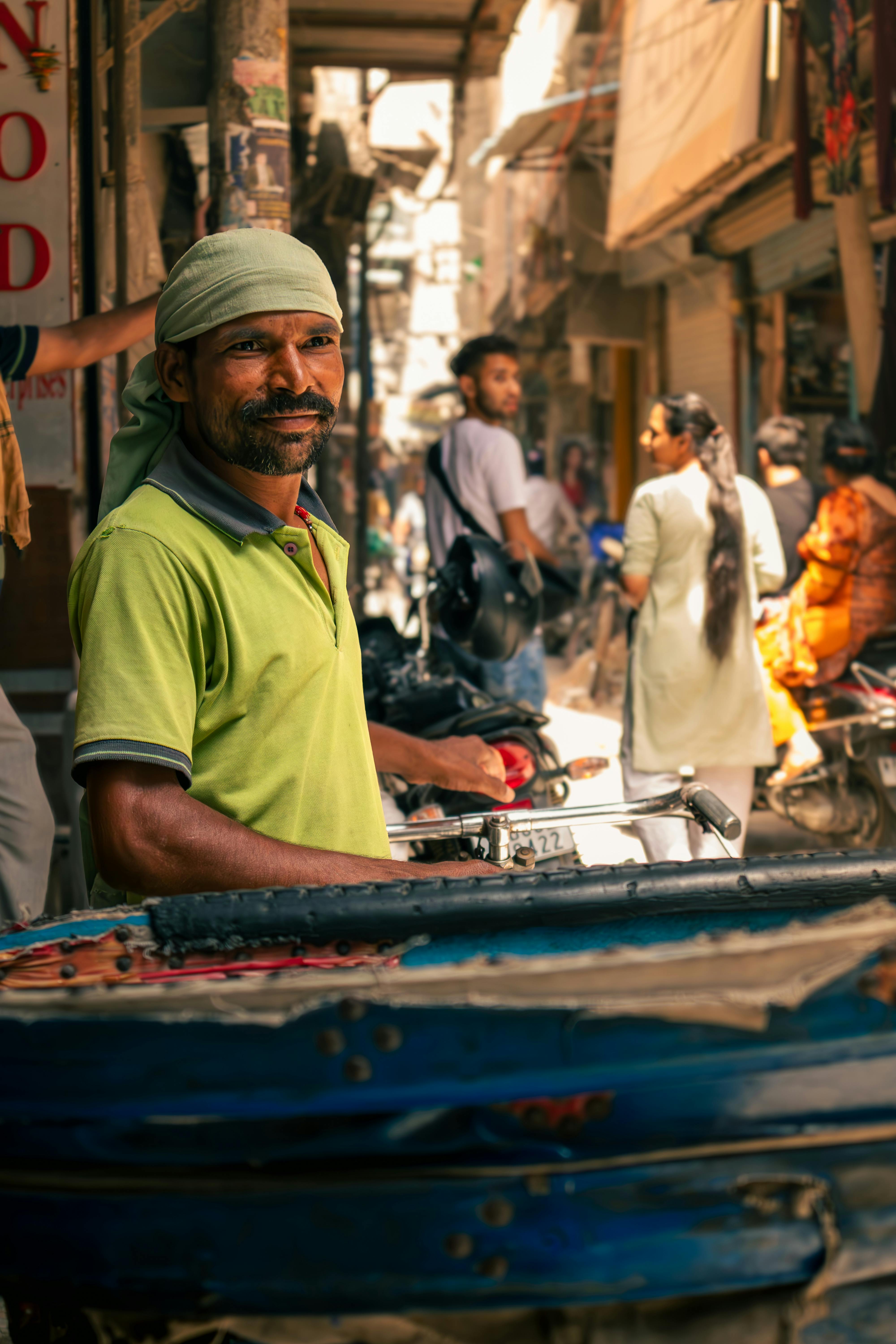Rickshaw Puller on a Busy Street in Jalandhar · Free Stock Photo