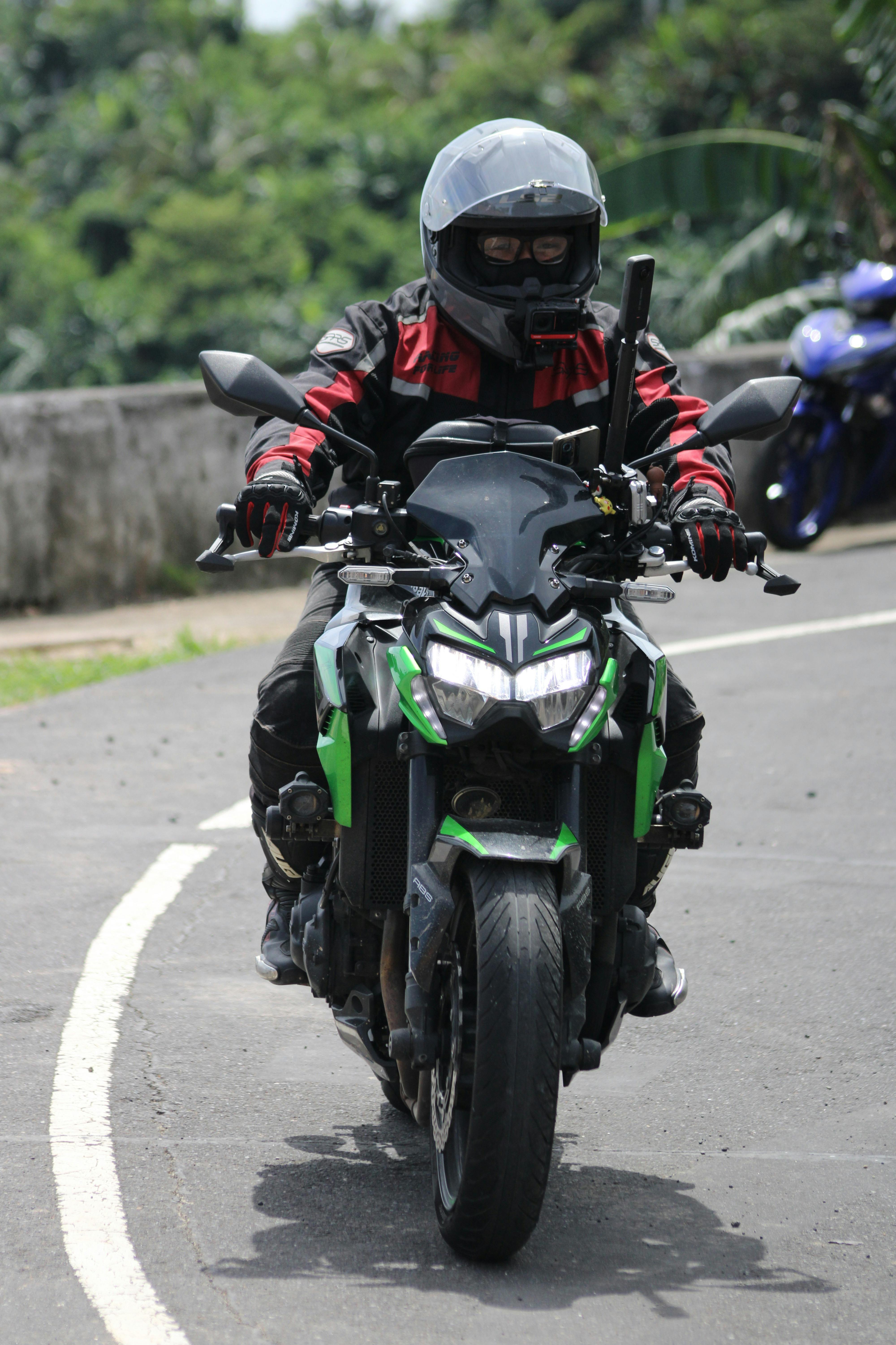 Man Riding a Motorcycle · Free Stock Photo
