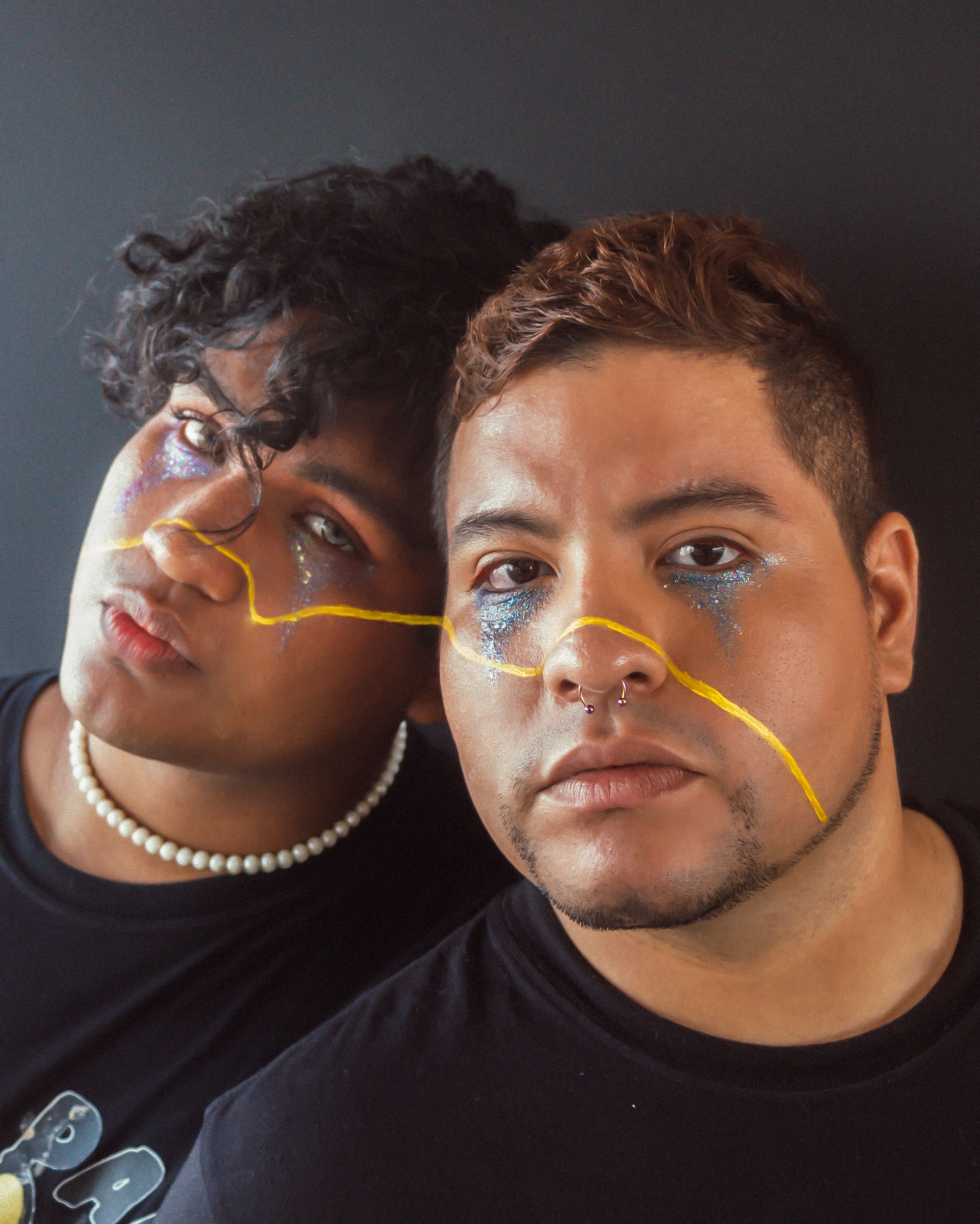 Artistic Portrait of Two Individuals with Face Paint · Free Stock Photo