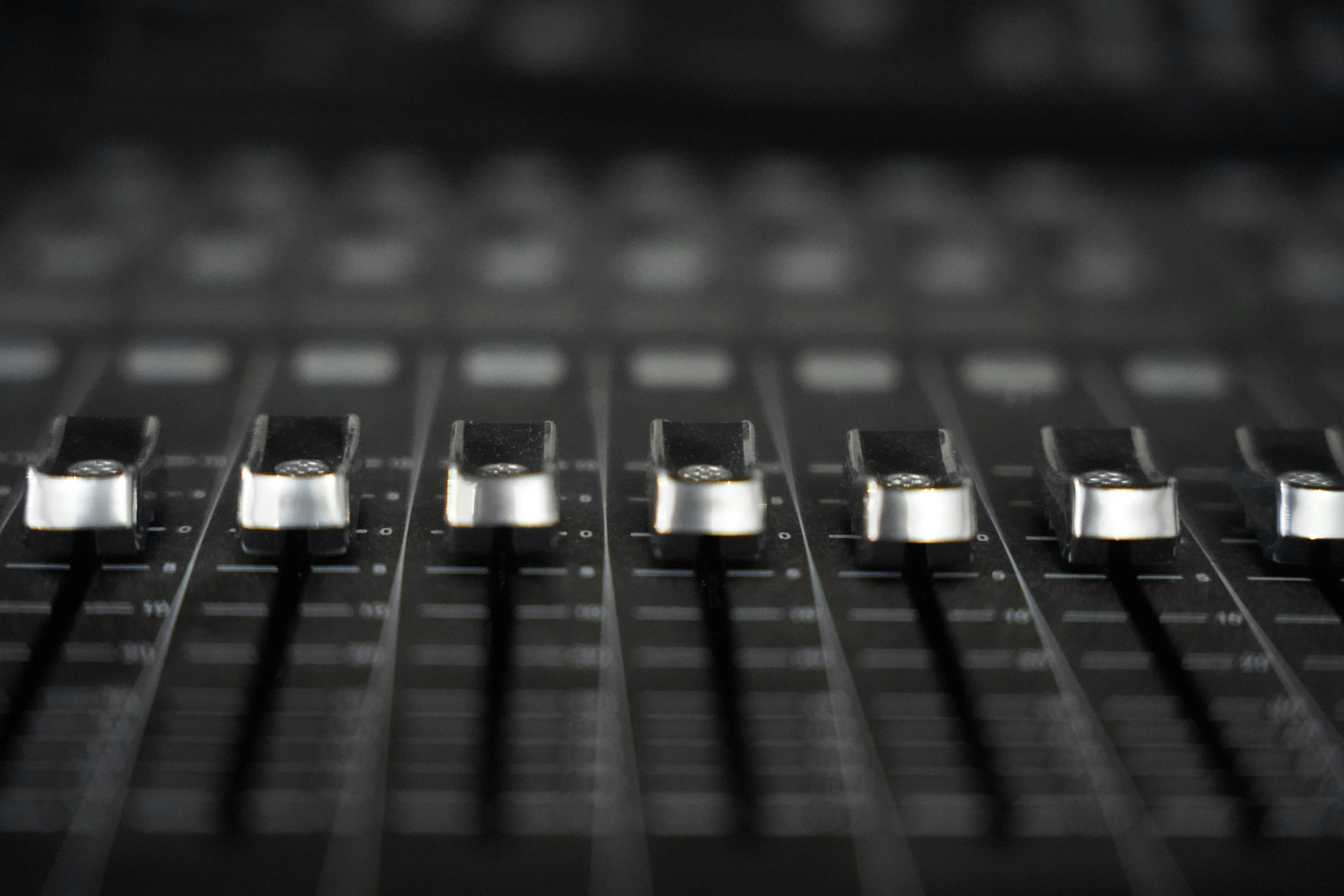 Close-up of Audio Mixer Faders in Studio Setting · Free Stock Photo